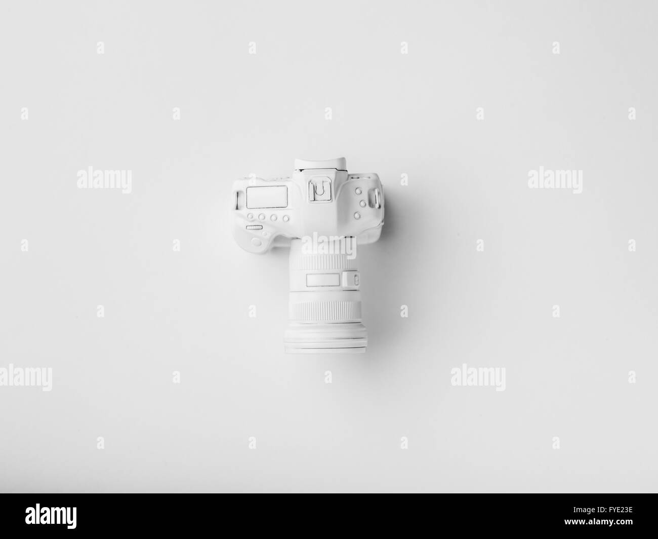 A white canon DSLR and lens against a plain white background Stock ...