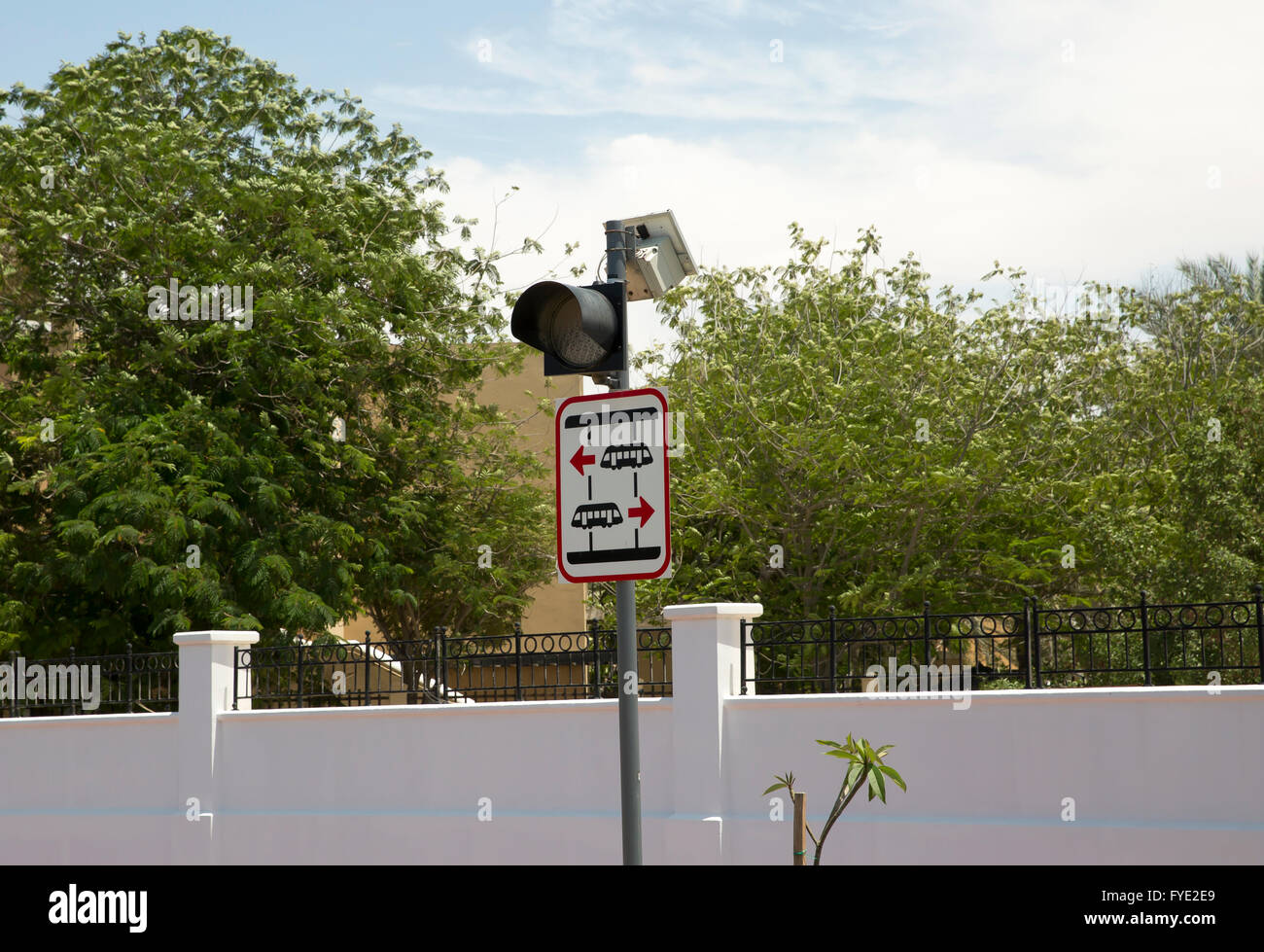 Tram warning sign and light in Dubai UAE Stock Photo - Alamy