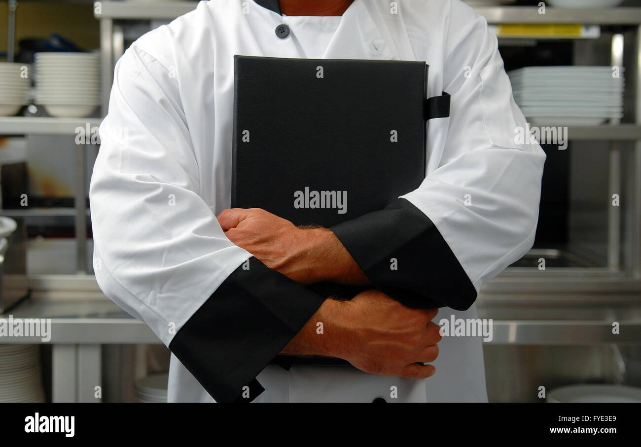 Chef with menu Stock Photo - Alamy
