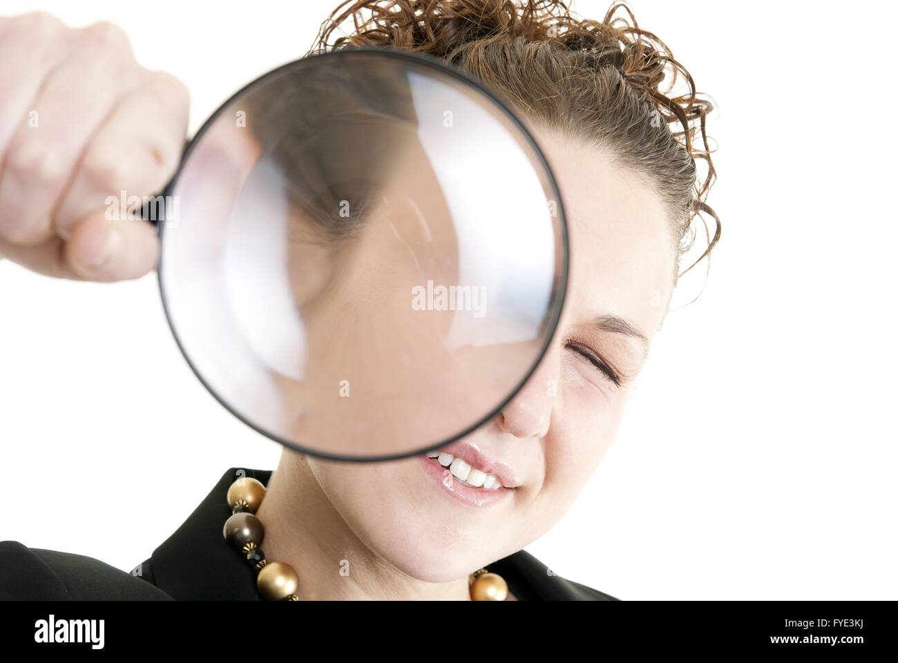 Business woman holding a magnifying glass Stock Photo - Alamy