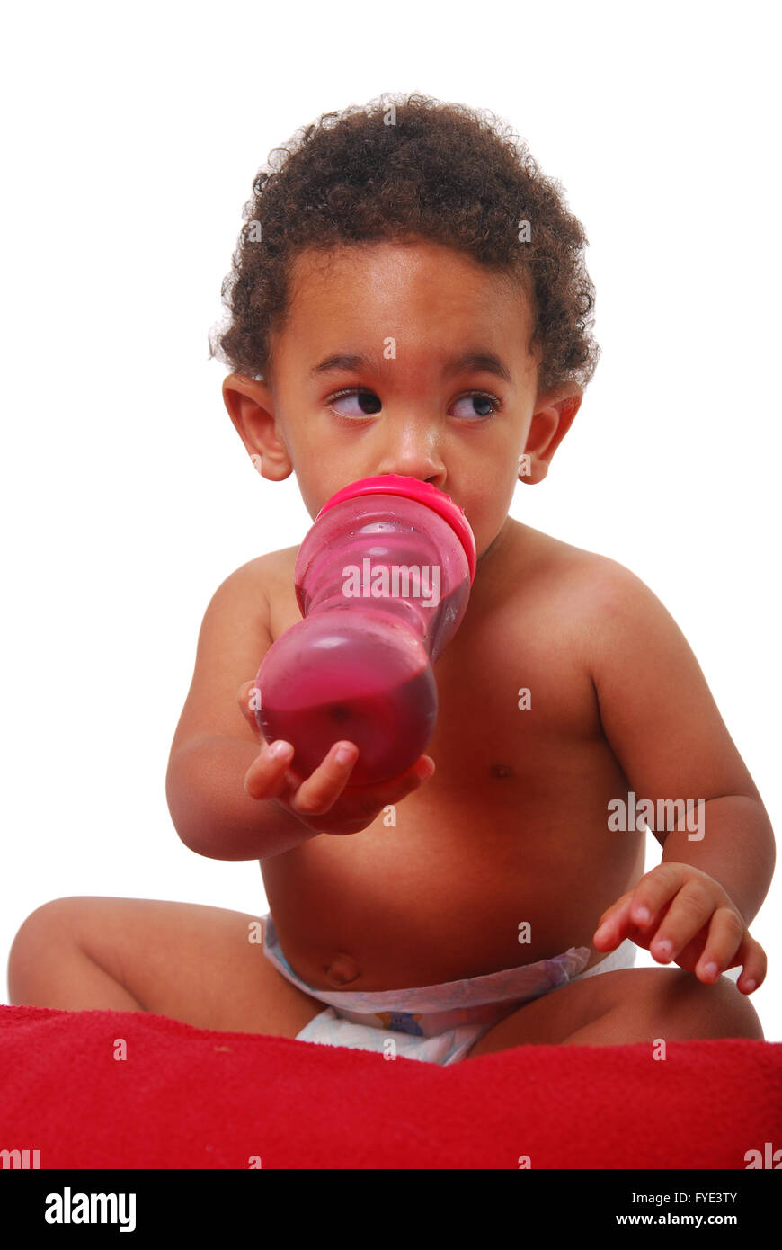 Multi-racial baby drinking Stock Photo - Alamy