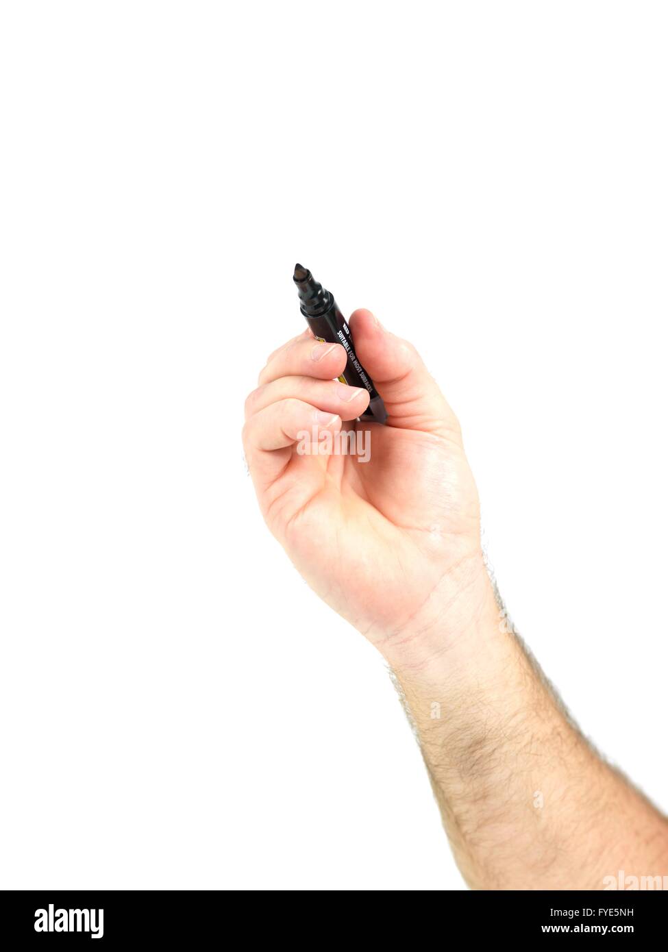 A hand writing with a black marka on a glass screen Stock Photo - Alamy