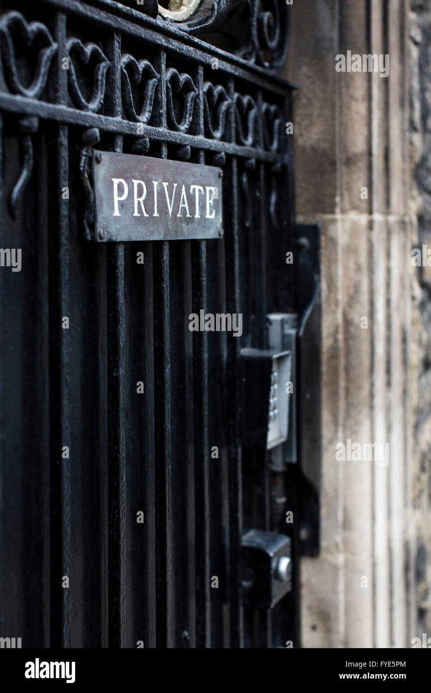 Private sign on an old iron gate Stock Photo - Alamy