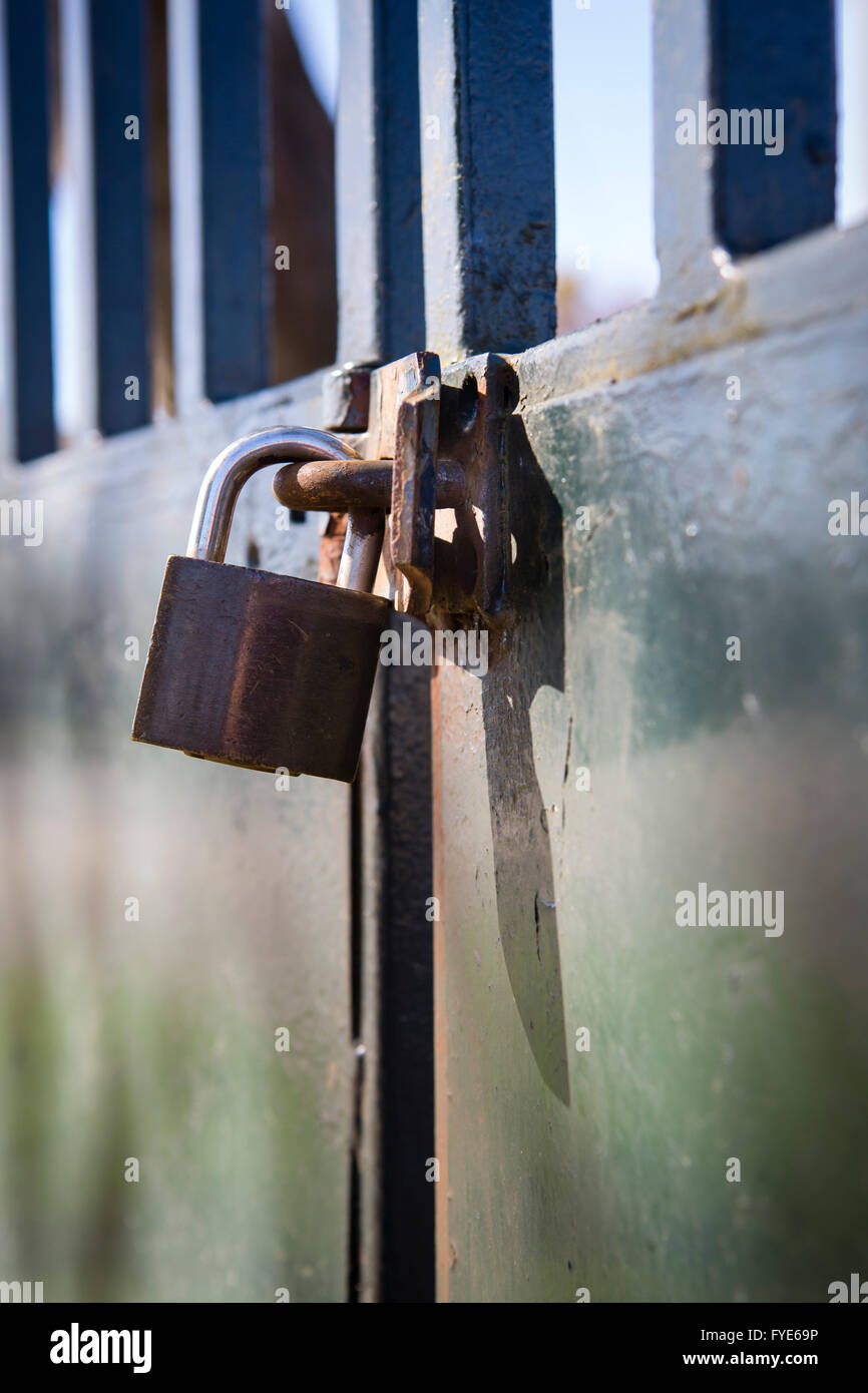 Padlocks and chains securing a local village hall Stock Photo - Alamy