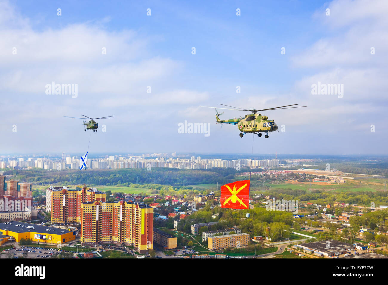 Helicopter with military flag over Moscow at parade of victory day ...
