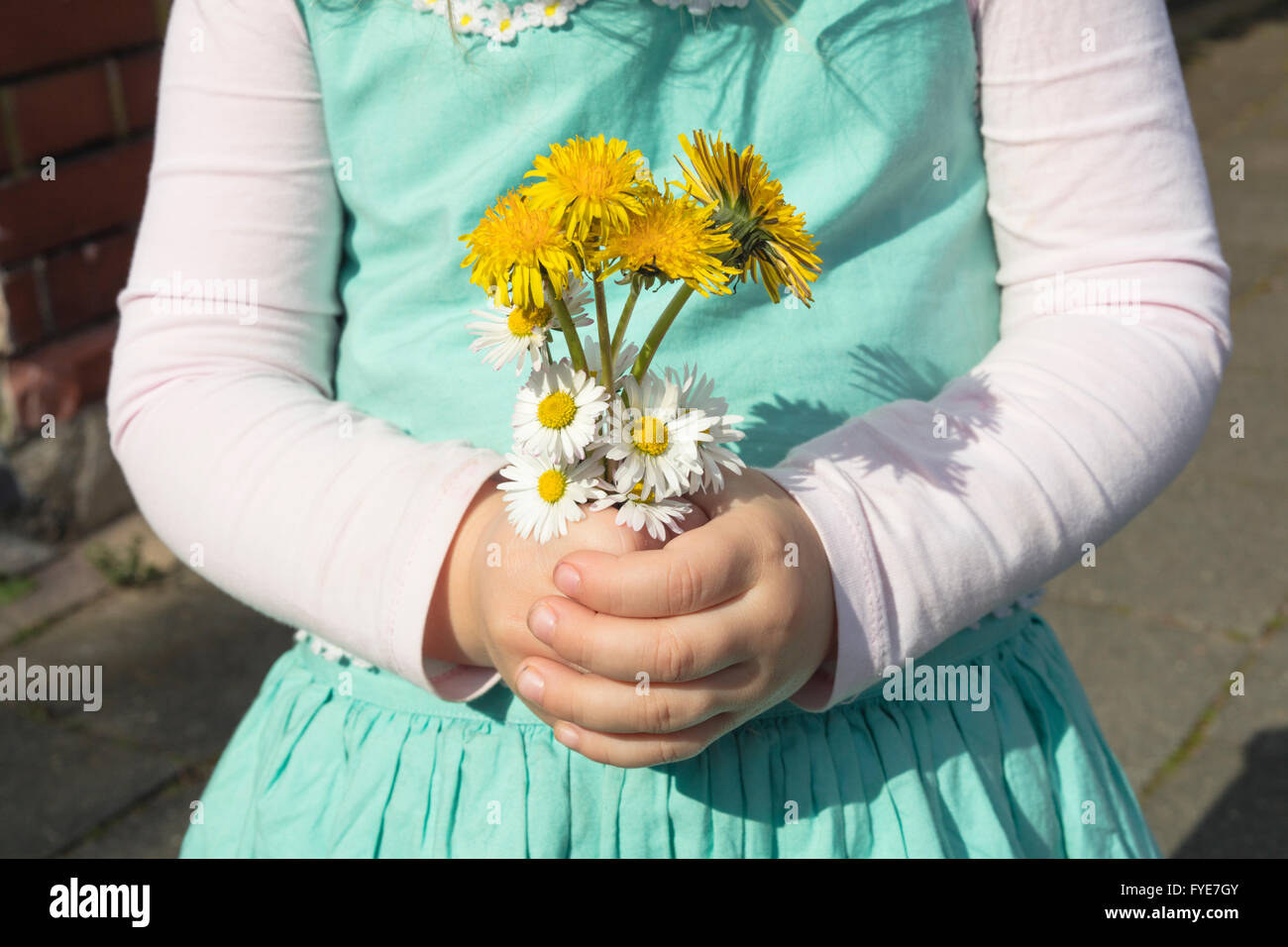 Girl giving flowers hi-res stock photography and images - Alamy
