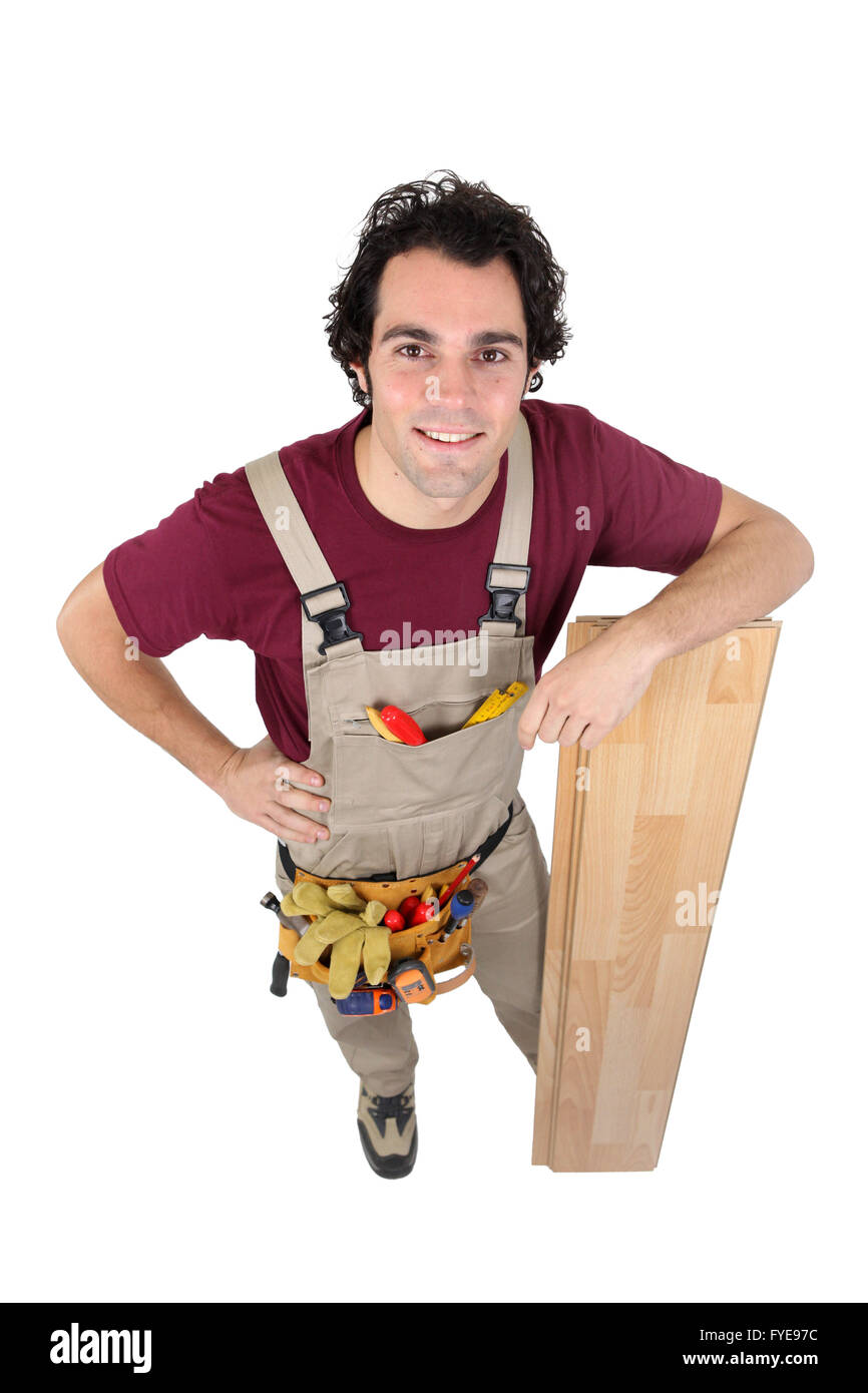 Smiling carpenter isolated on white background Stock Photo - Alamy