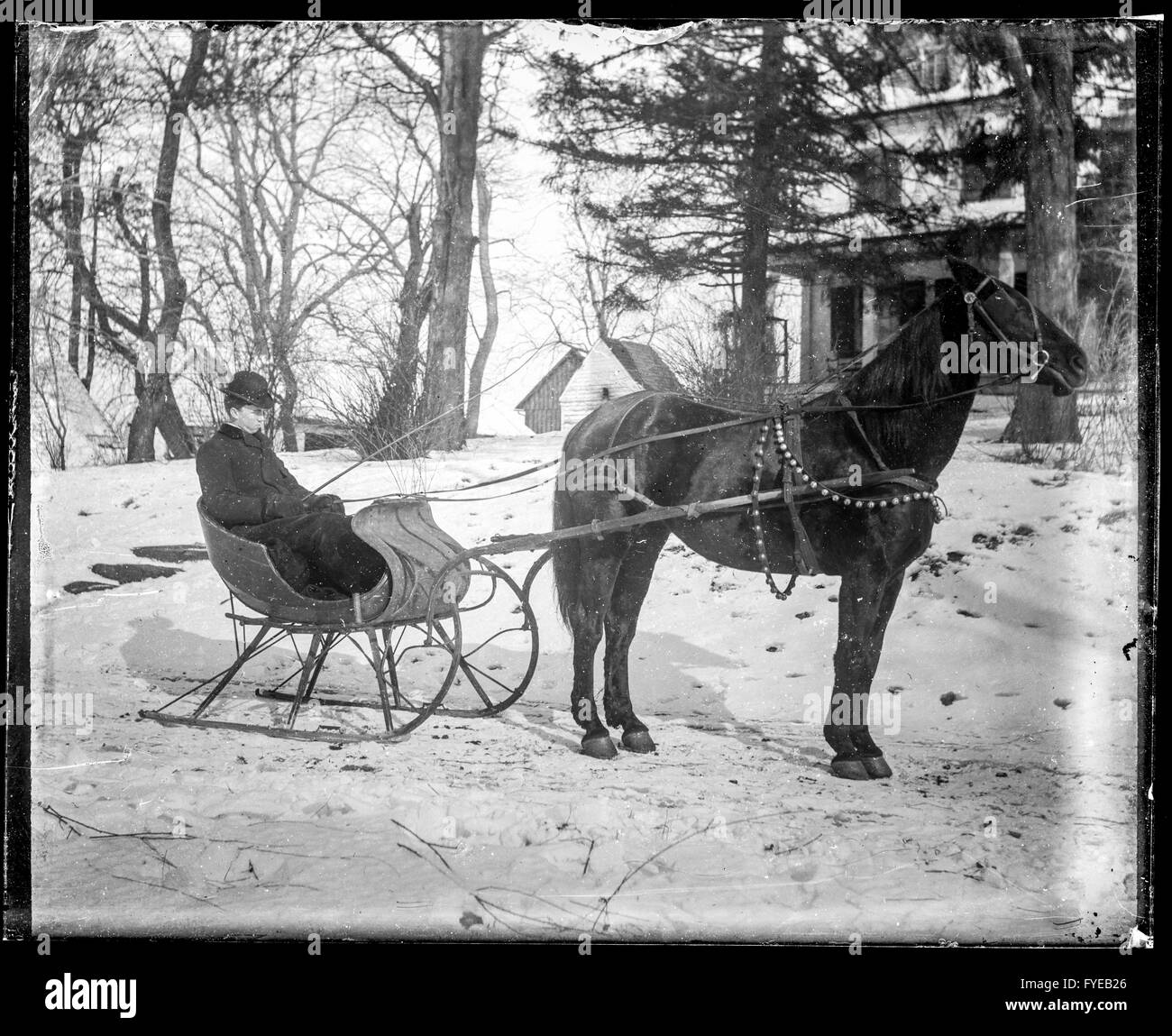 Victorian photograph of a man with a horse and carriage in the snow in ...