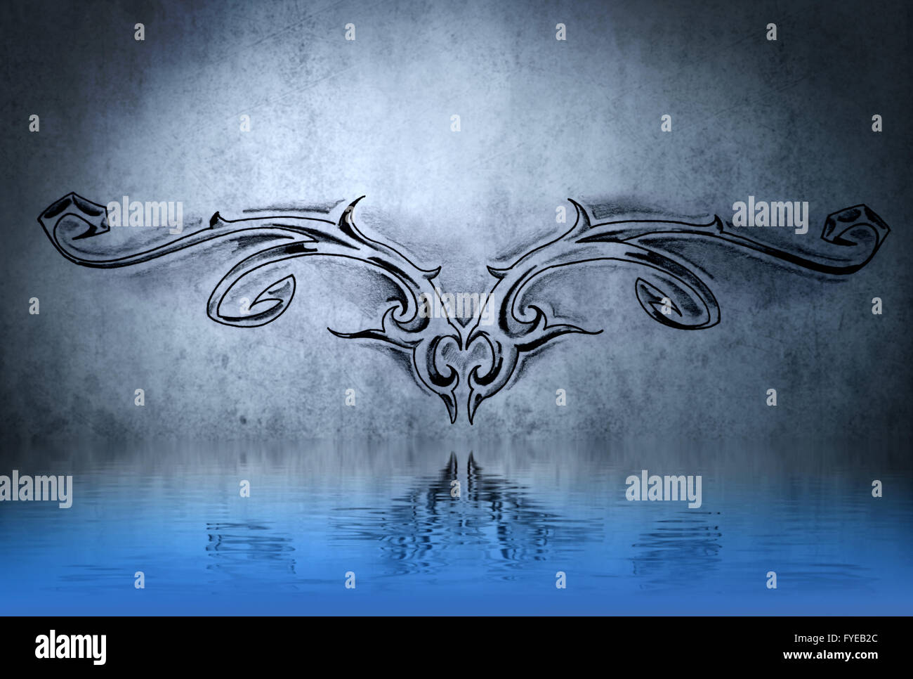 Tattoo on blue wall with water reflections Stock Photo - Alamy