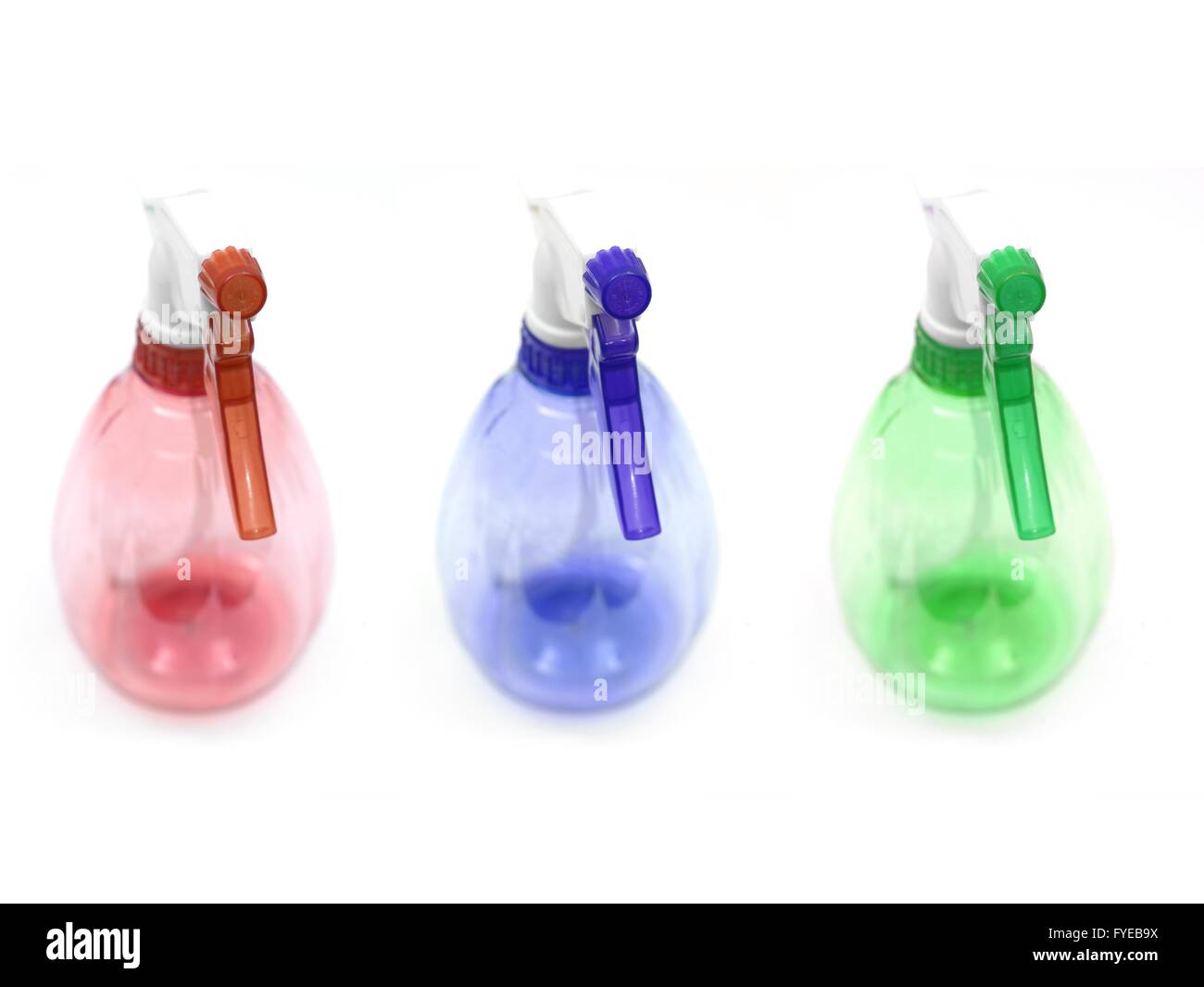 Environmentally safe cleaning products isolated against a white ...