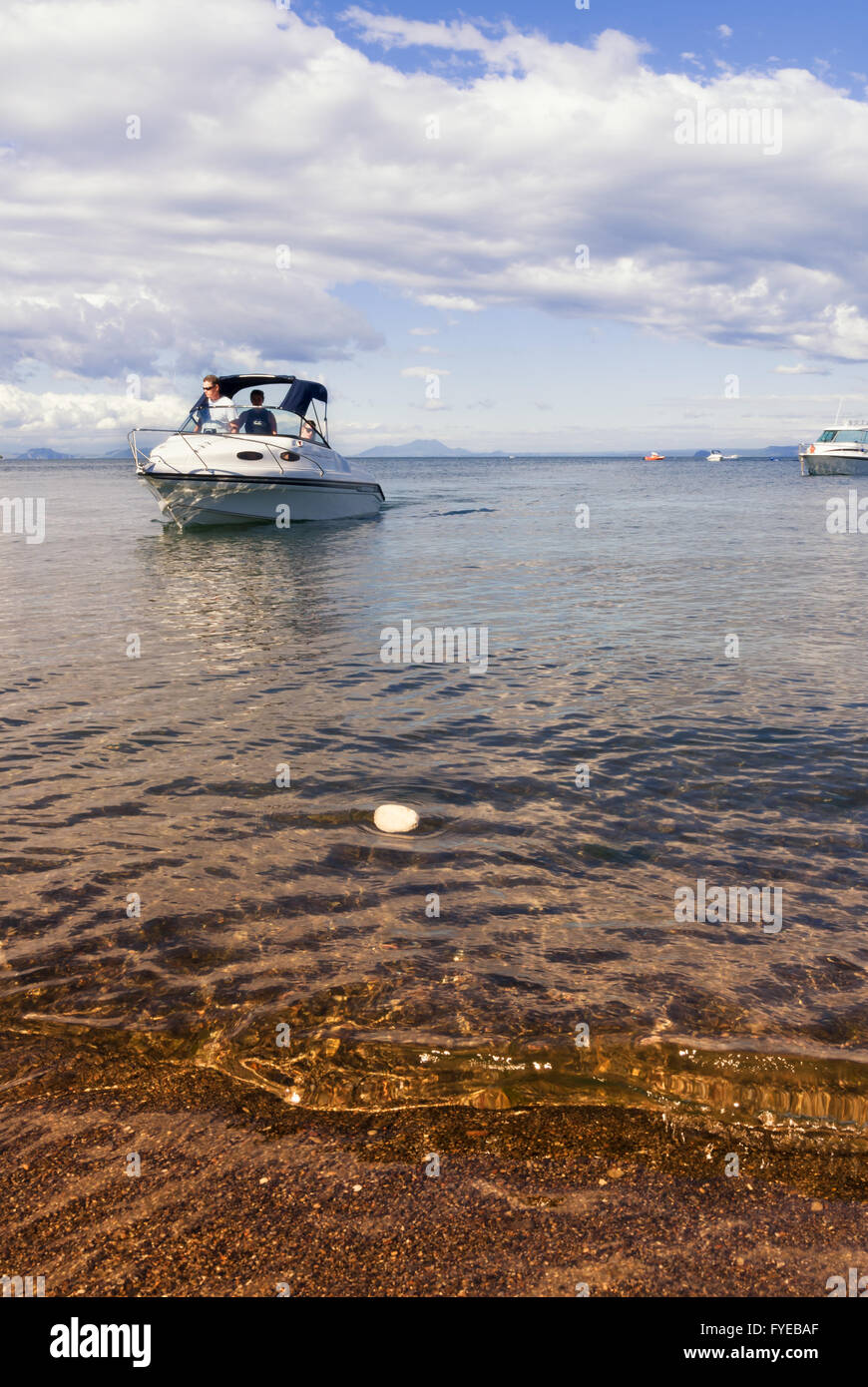 Boats on Lake Taupo in New Zealand's North Island a piece of volcanic ...