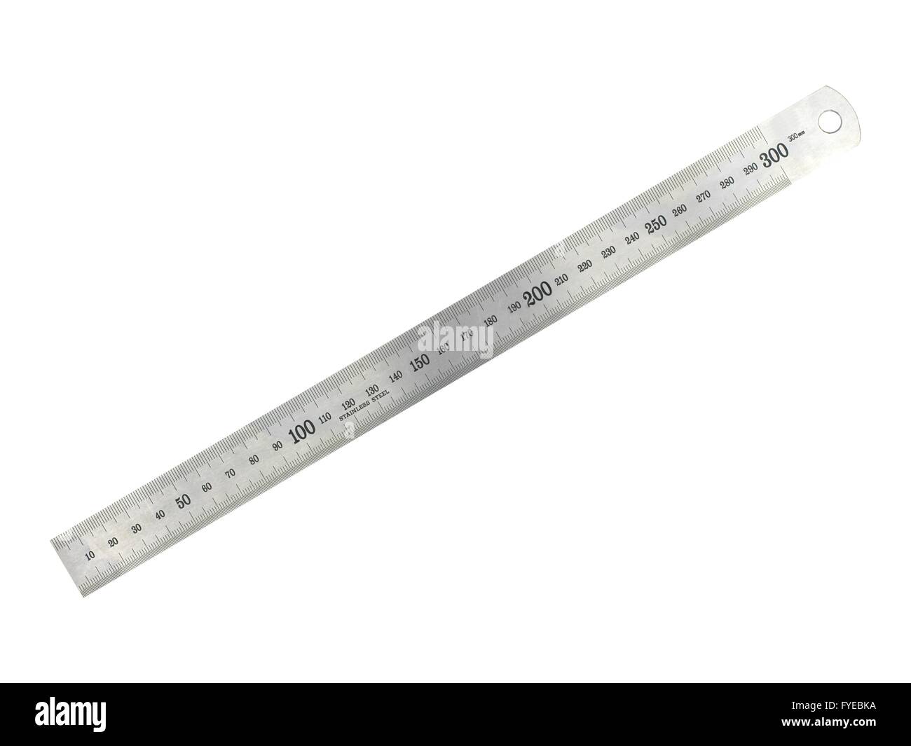A metal ruler isolated against a white background Stock Photo - Alamy