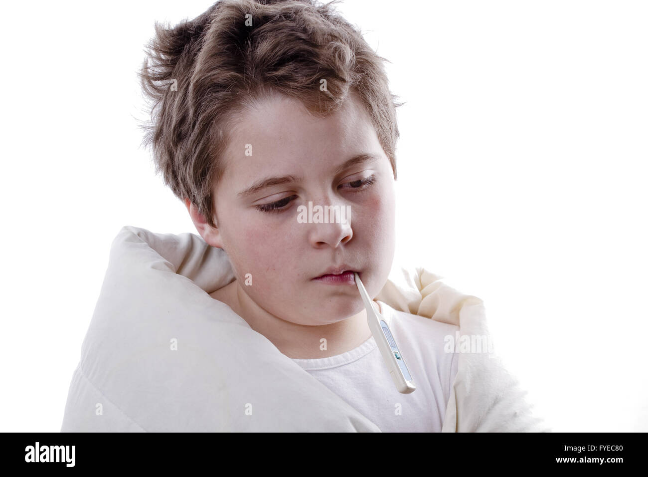 Young boy patient with fever, with digital thermometer and white ...