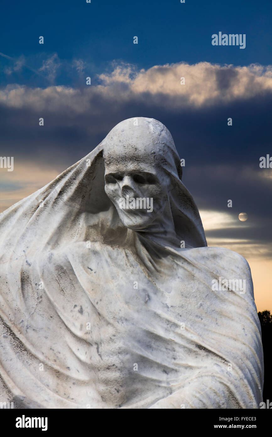 Statue of the Death with a veil with a sunset landscape at the ...