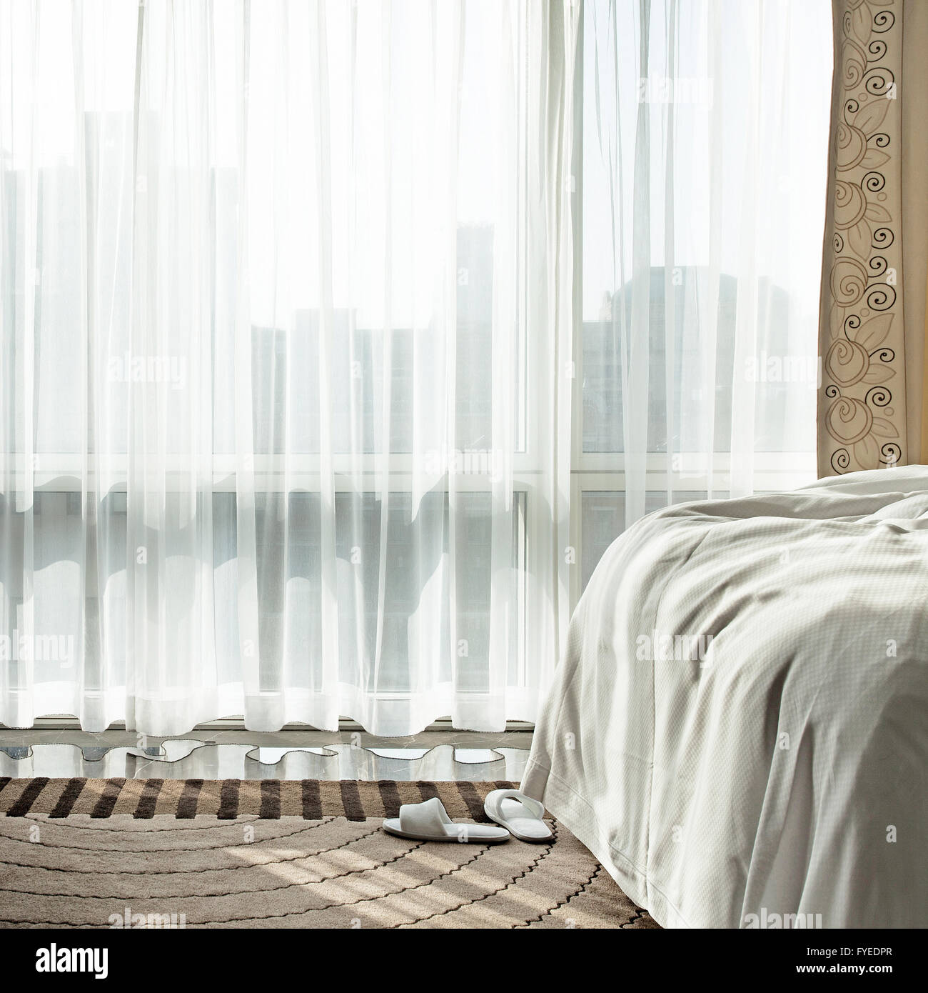 bed with first sunlight Stock Photo - Alamy