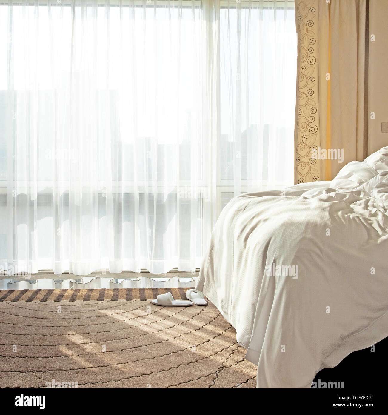 bed with first sunlight Stock Photo - Alamy