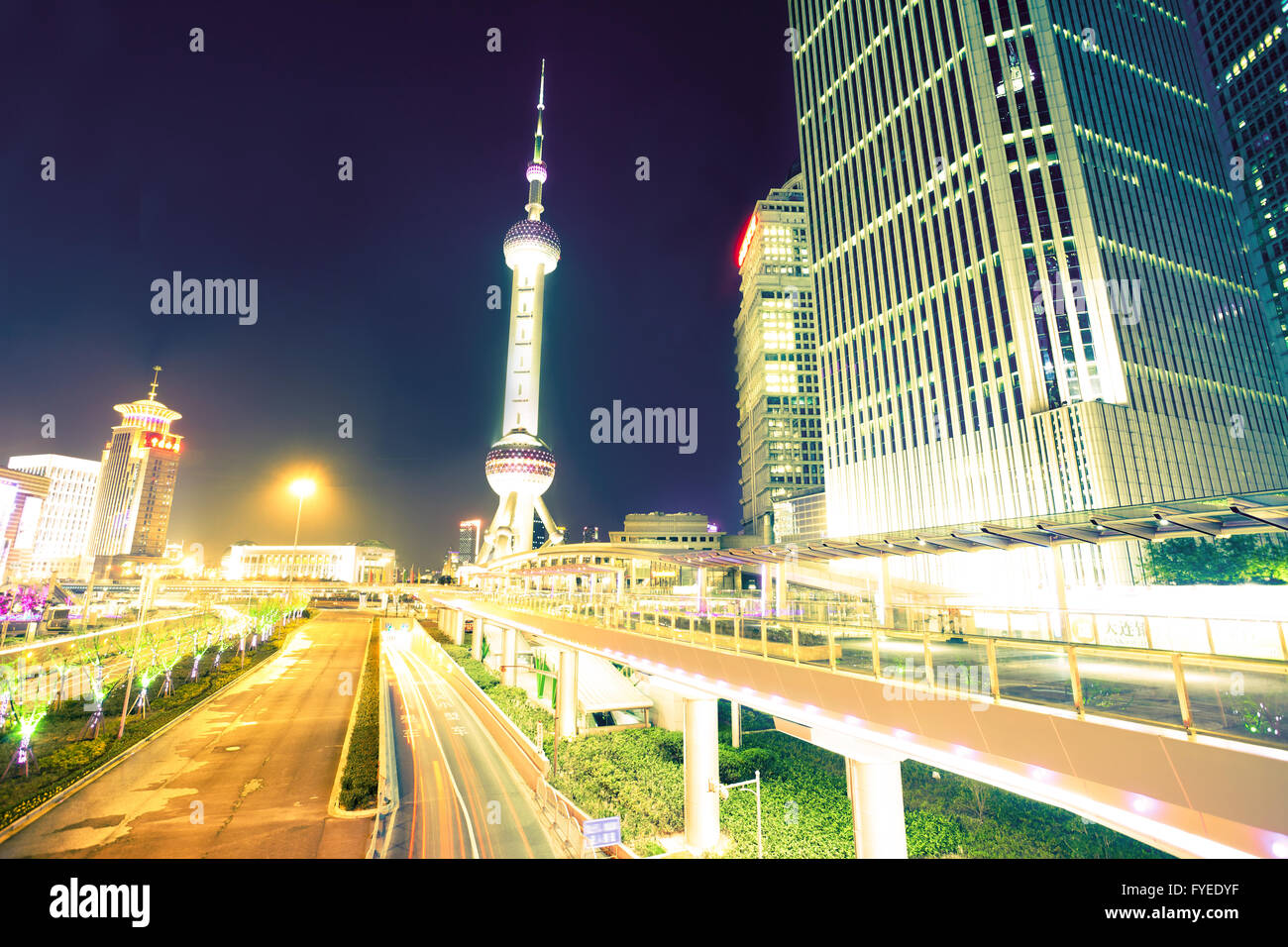 the light trails on the modern building background Stock Photo - Alamy
