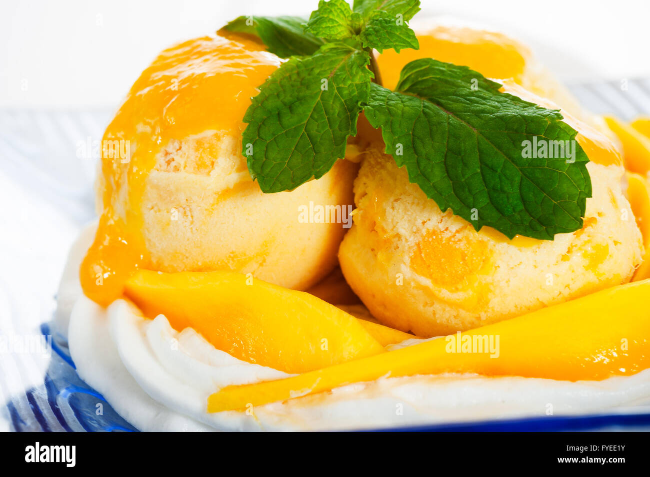 Mango ice cream Stock Photo - Alamy