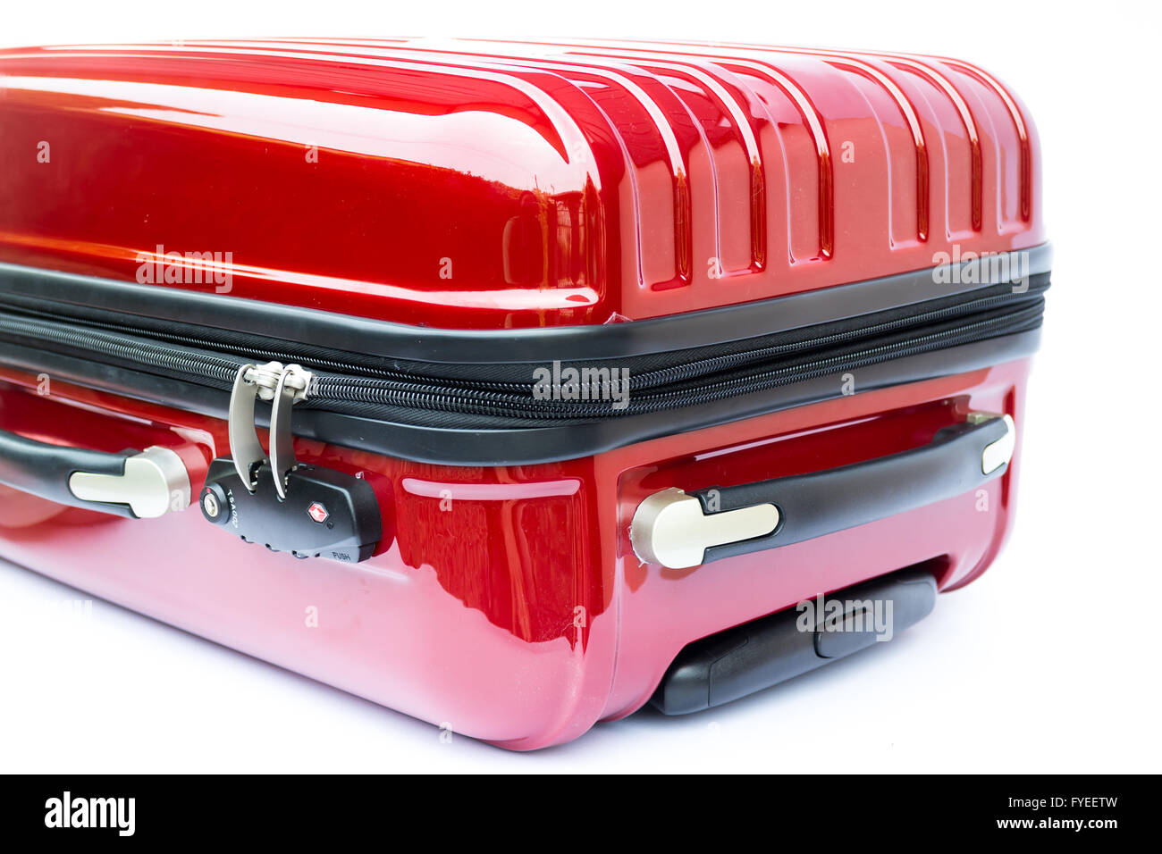 Locked and zip closed of red suitcase, stock photo Stock Photo - Alamy