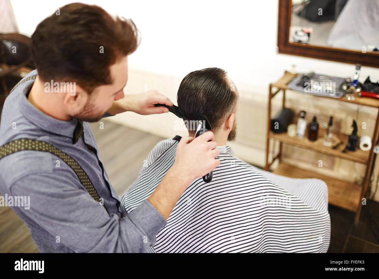 Handsome young man cutting hi-res stock photography and images - Alamy