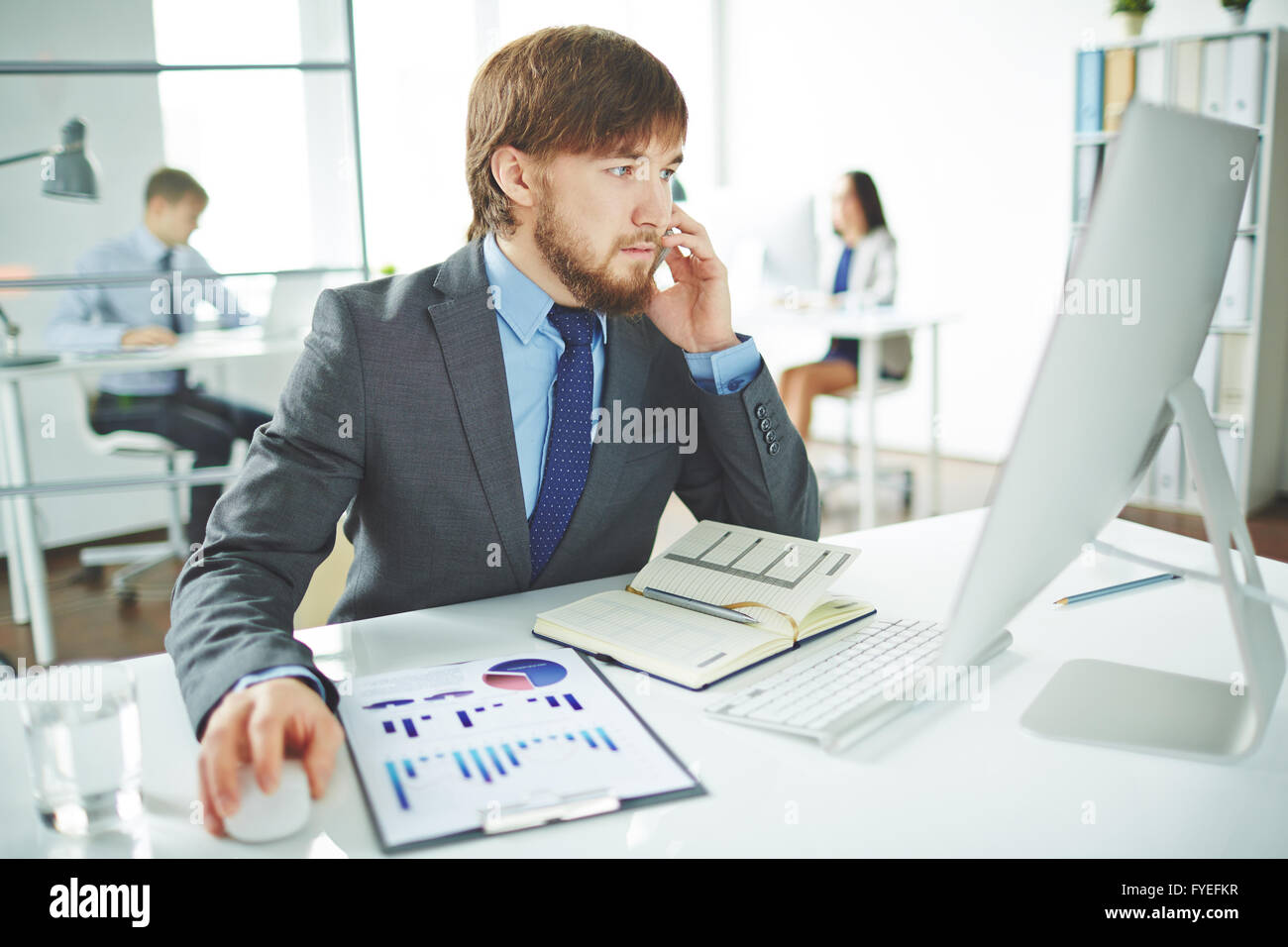 Agent in office Stock Photo - Alamy