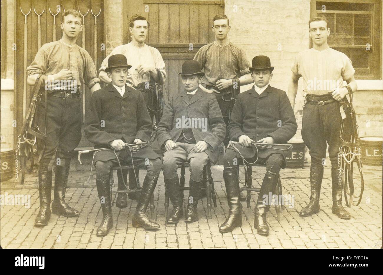 Portrait of L.E.S. stable staff Stock Photo - Alamy