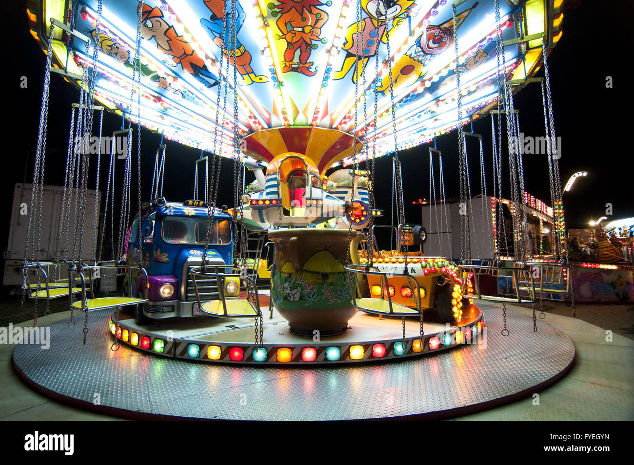 Amusement park at night Stock Photo - Alamy
