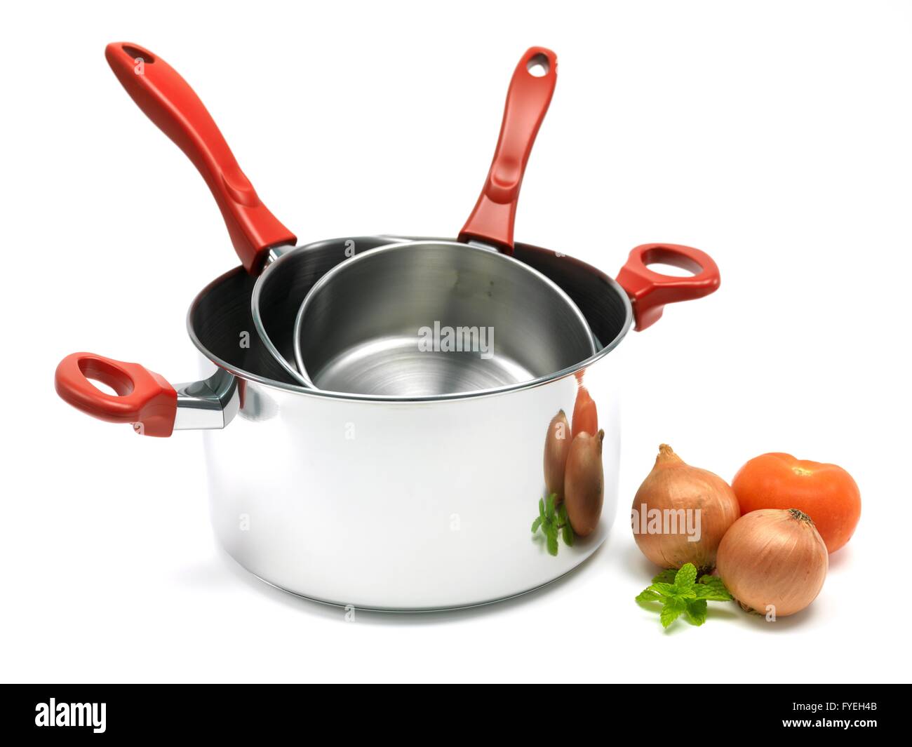 Silver cooking pots isolated against a white background Stock Photo - Alamy
