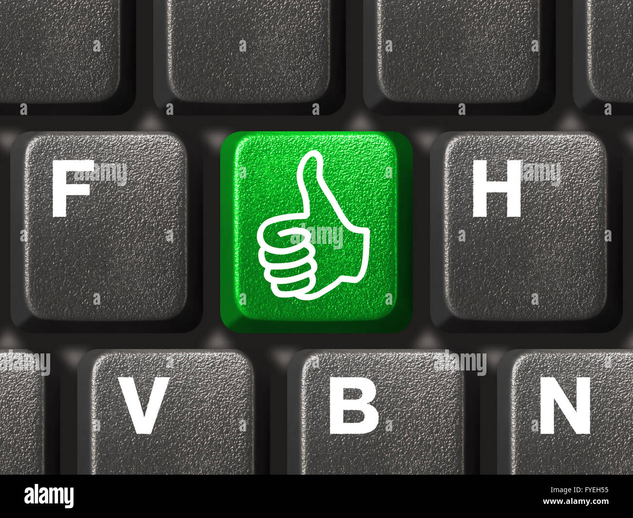 Computer keyboard with thumb gesturing hand key Stock Photo - Alamy