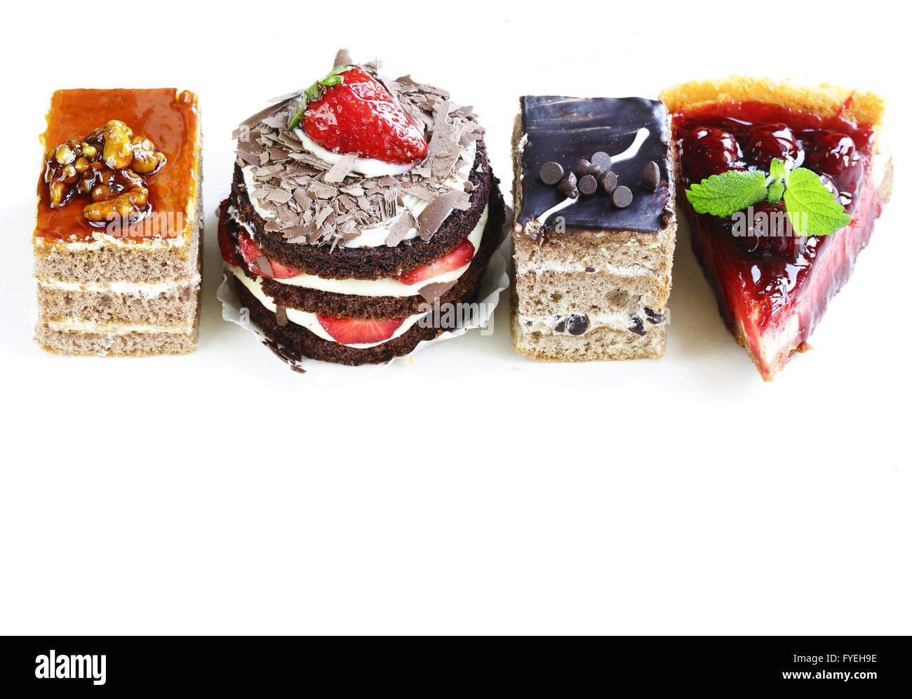 Assorted desserts, cakes and pastries on a white background Stock Photo ...