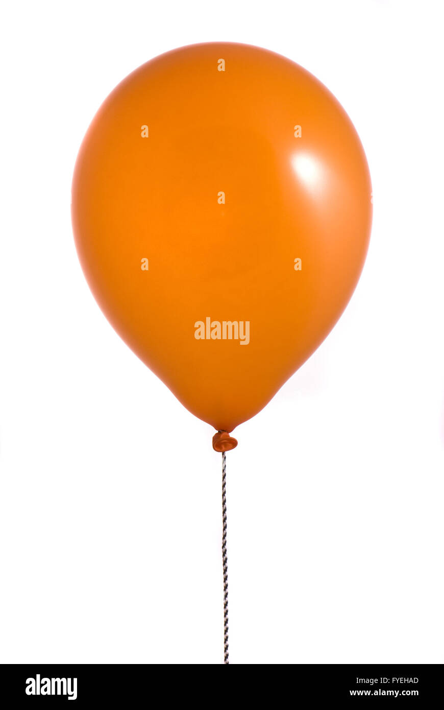 Orange balloon on white background Stock Photo - Alamy