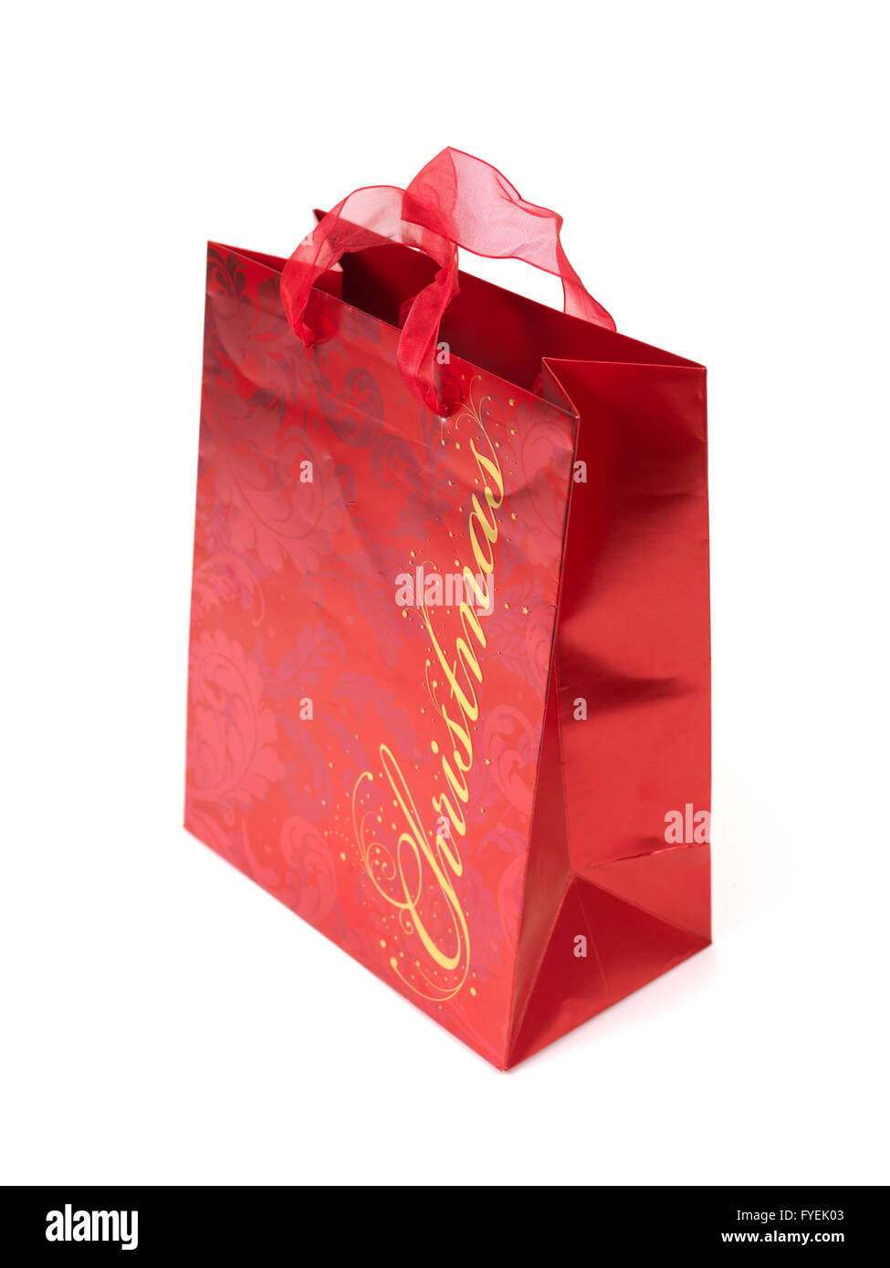 A gift bag isolated against a white background Stock Photo - Alamy