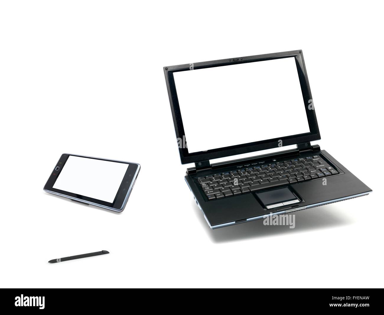 A laptop computer and a pda device isolated against a white background ...