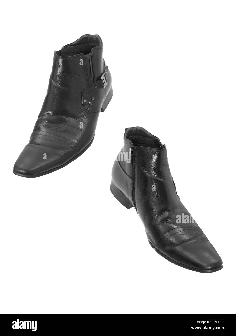 Modern boots isolated against a white background Stock Photo - Alamy