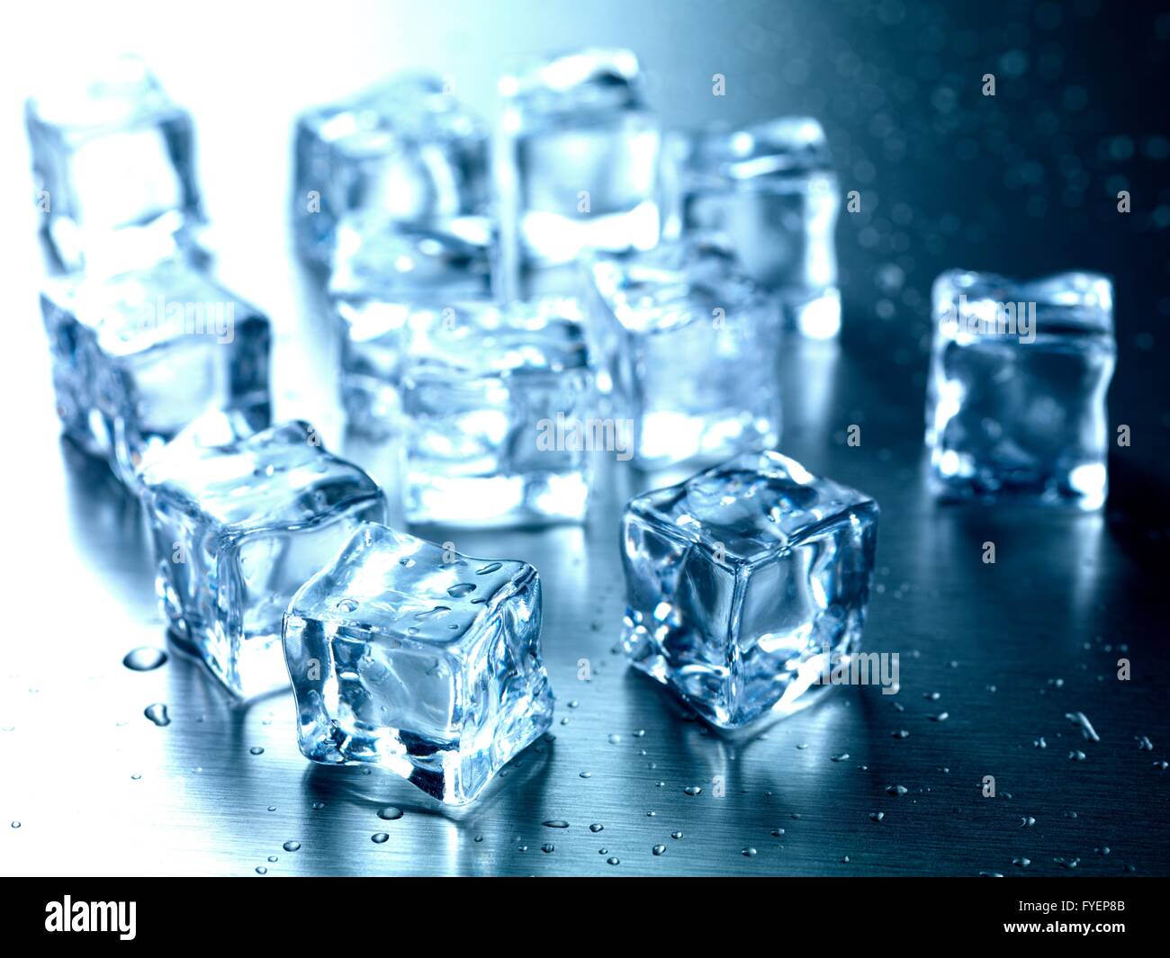 Frozen ice cubes isolated on a kitchen bench Stock Photo - Alamy
