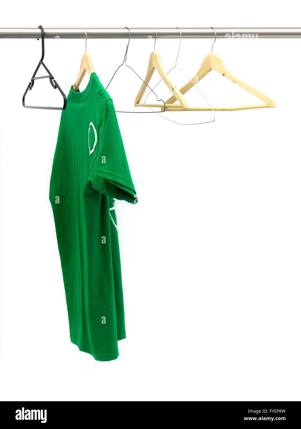 Garments hanging on coat hanger isolated against a white background ...
