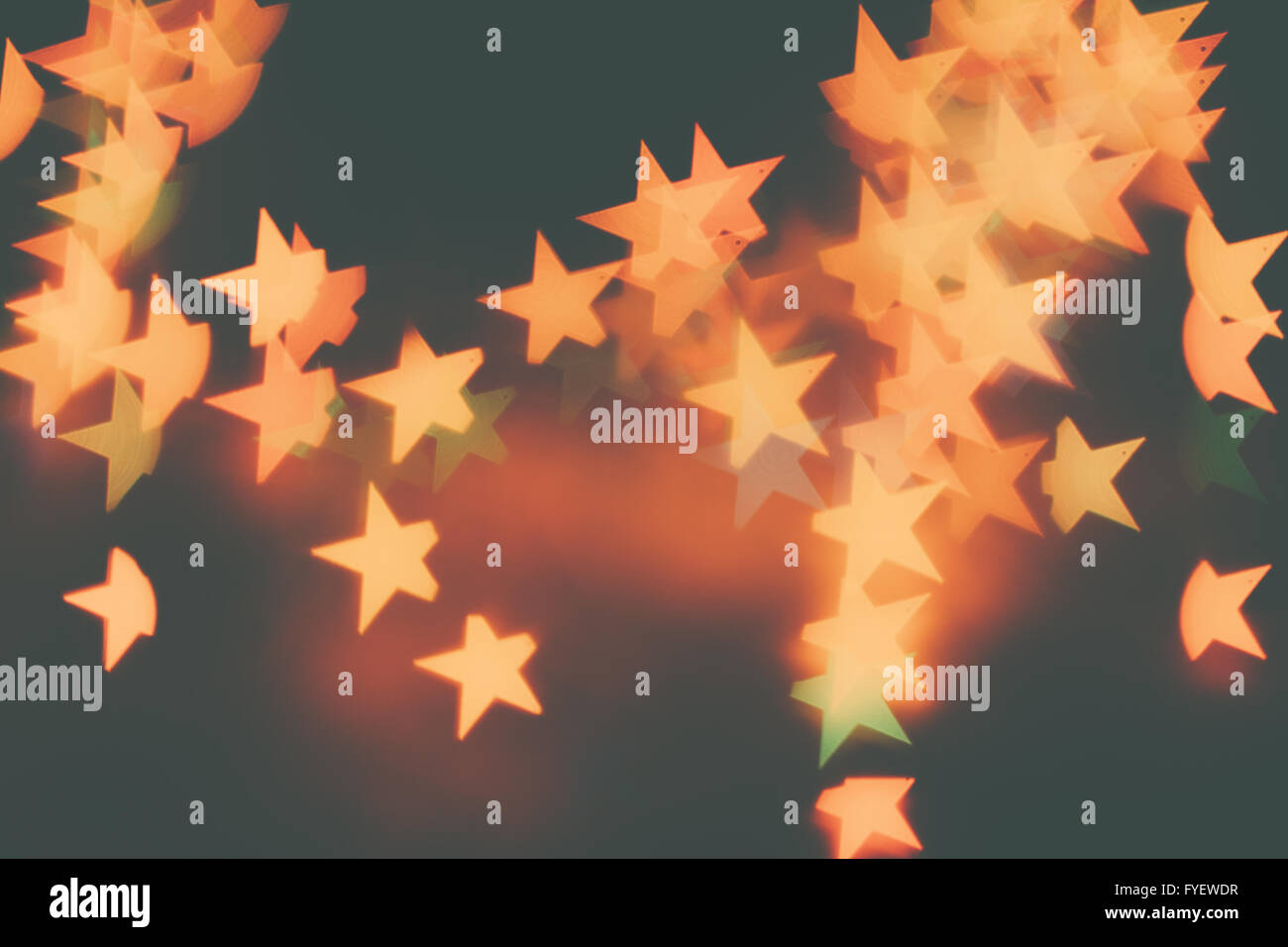 Many orange stars on a dark background Stock Photo - Alamy