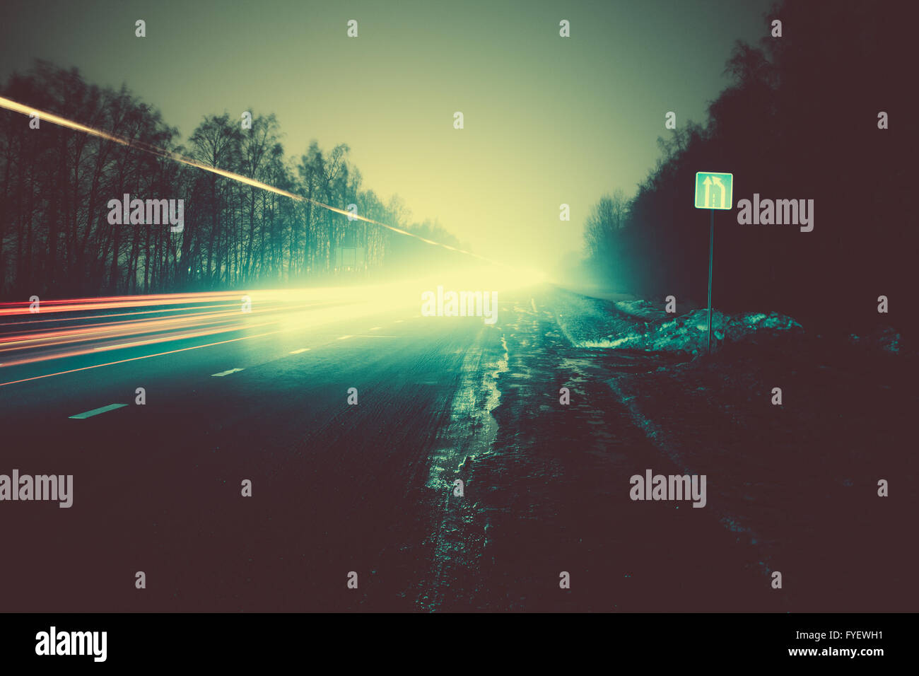 Car light trails in the road at night Stock Photo - Alamy