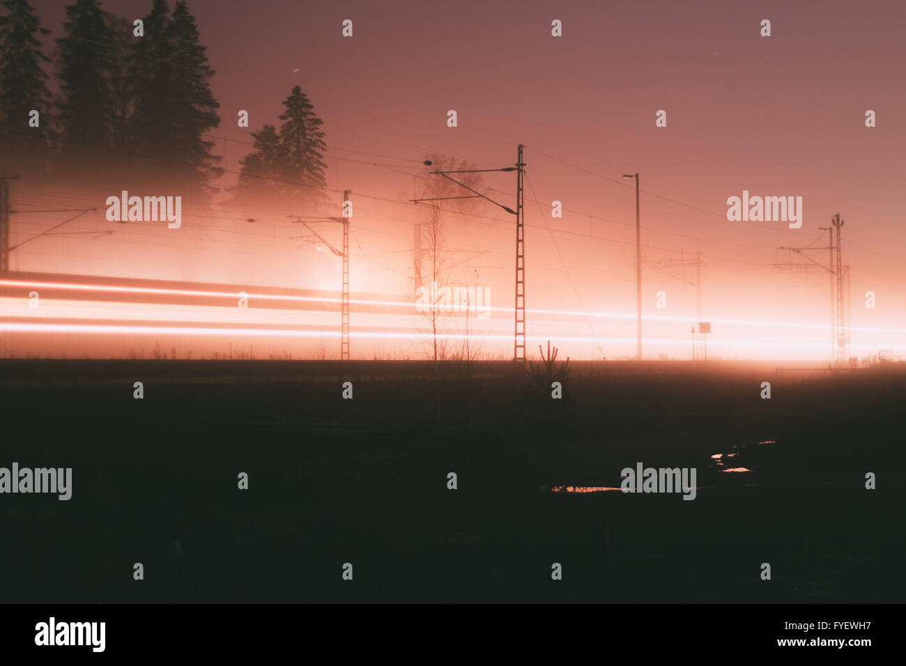 Car light trails in the road at night Stock Photo - Alamy