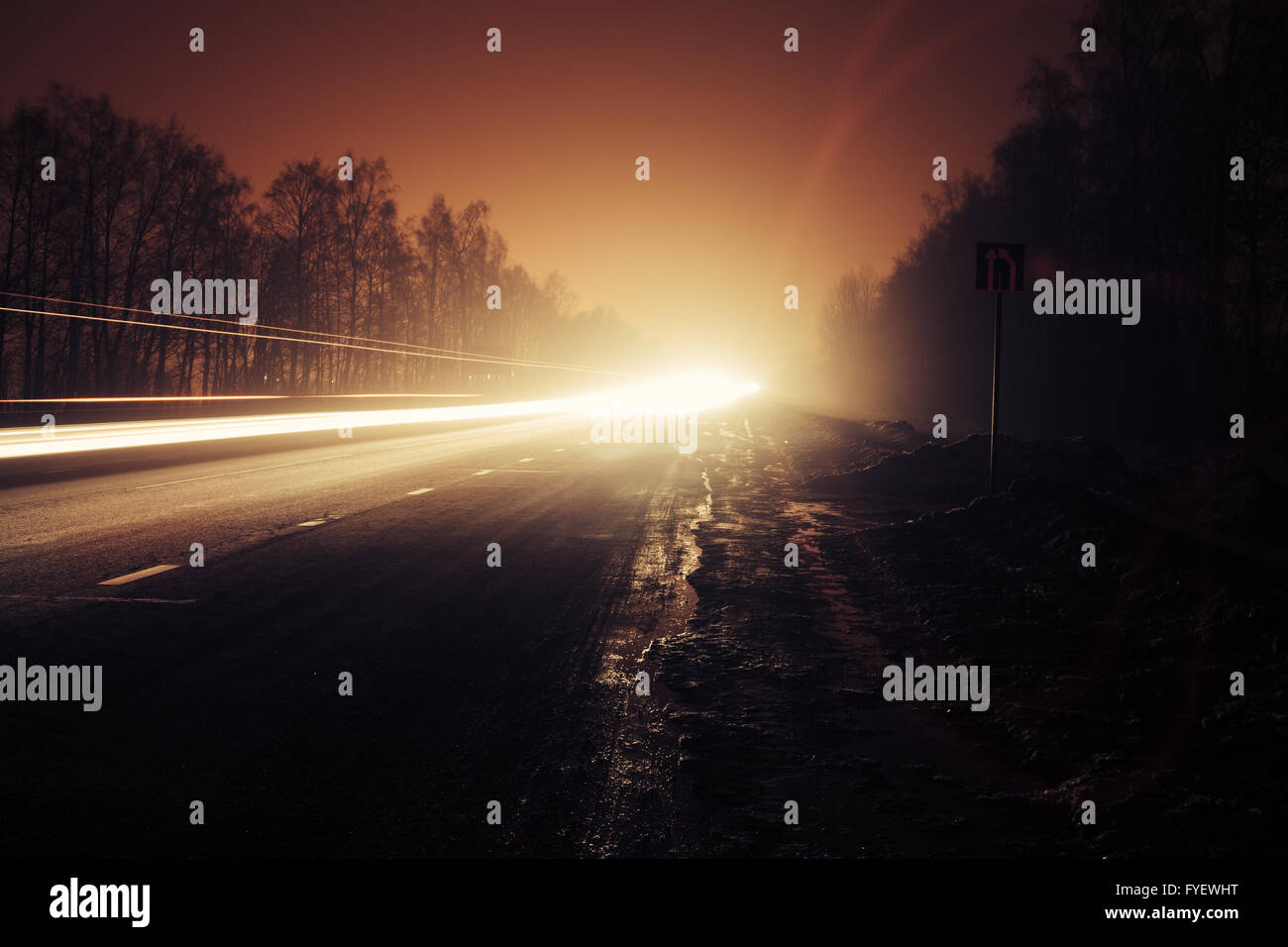 Car light trails in the road at night Stock Photo - Alamy