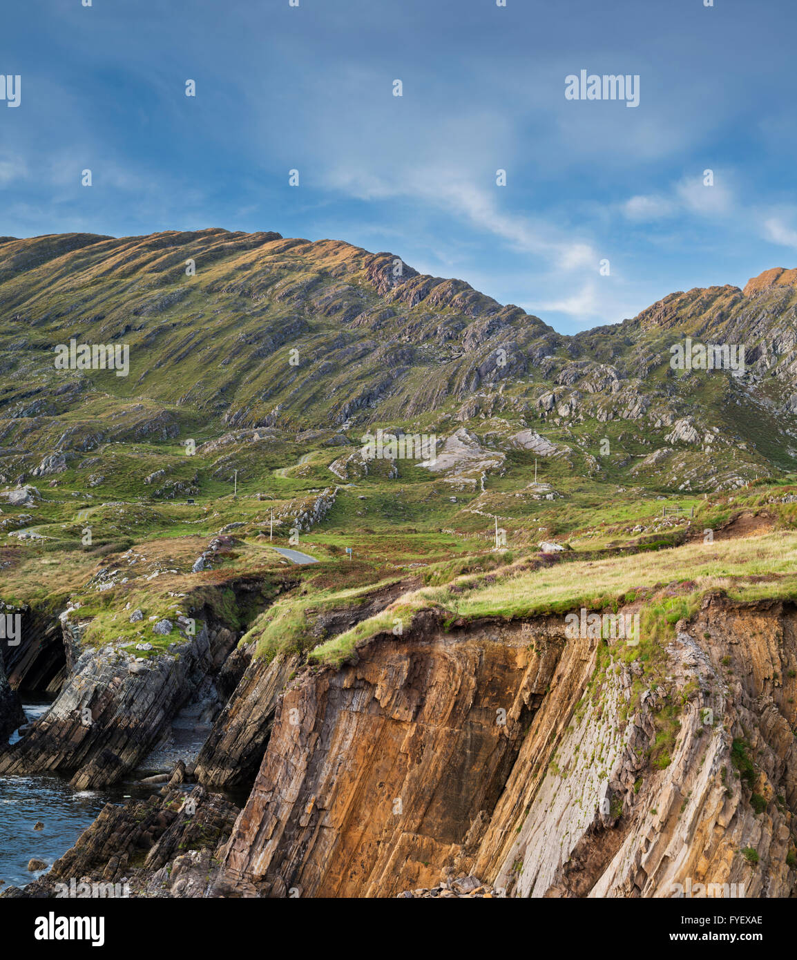 Rocky sea cliffs near Allihies, Beara, County Cork, Ireland, with the ...