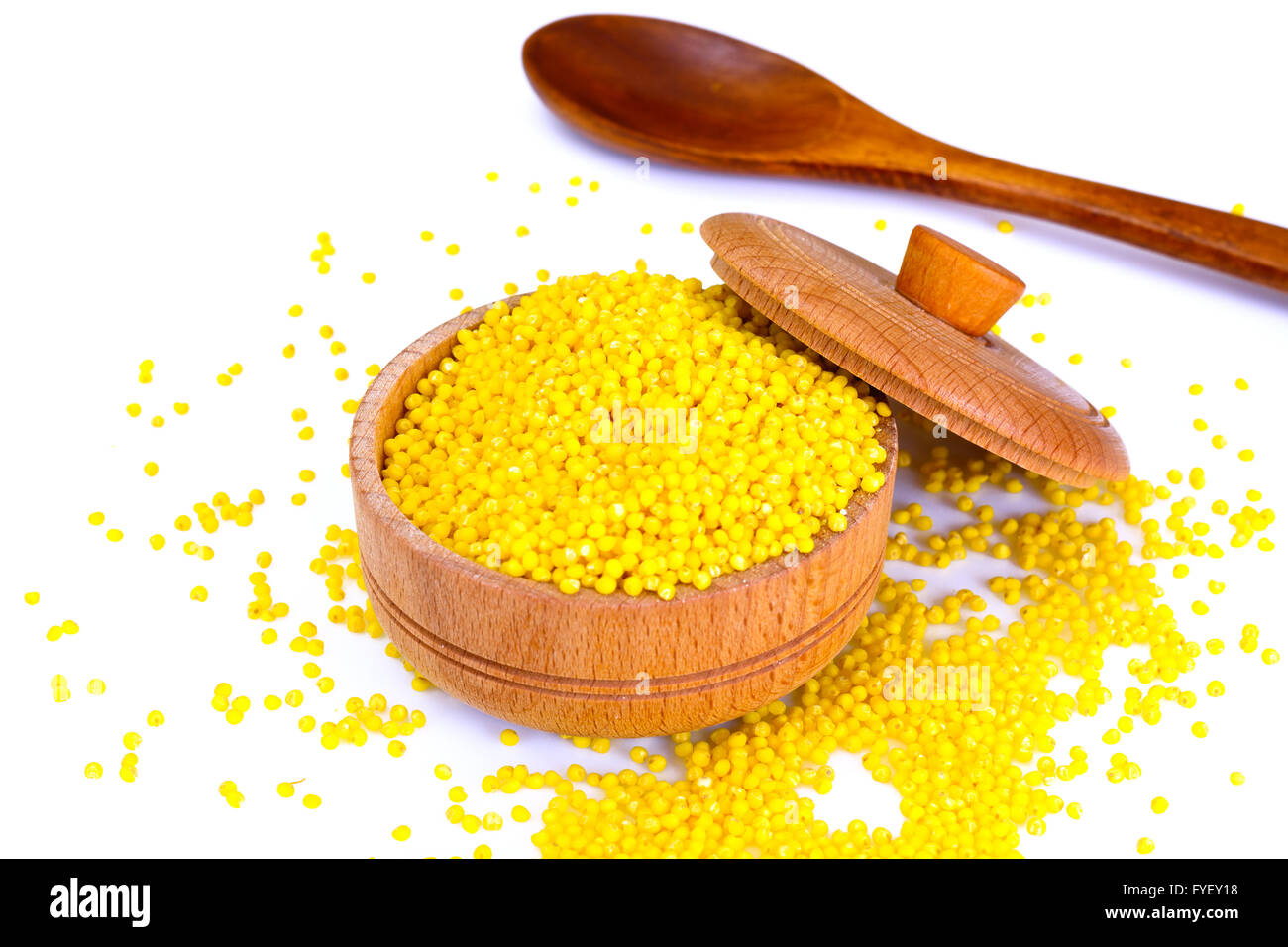 Healthy and diet food: Millet in wooden bowl. Isolated Stock Photo - Alamy