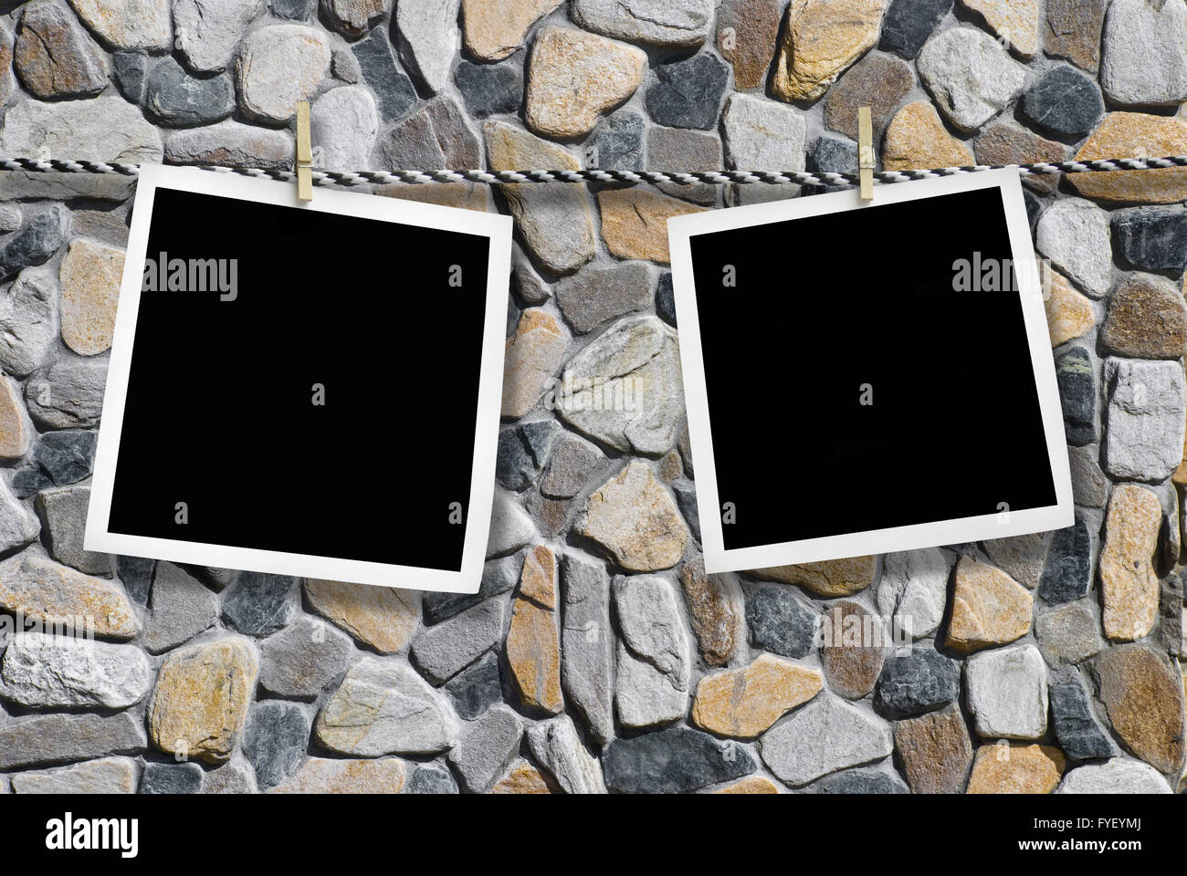 vintage photos on a rope Stock Photo - Alamy