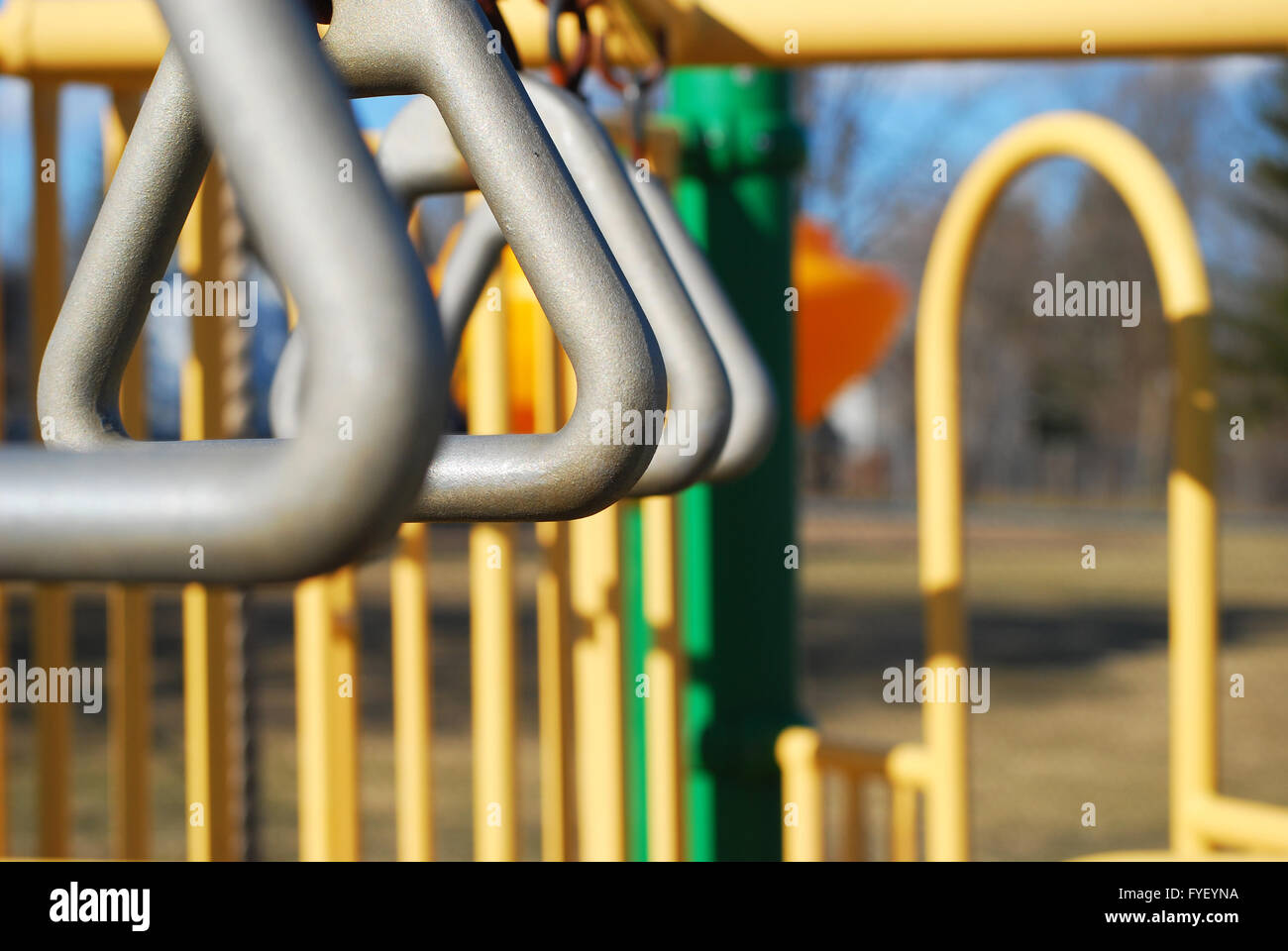 Yellow monkey bars hi-res stock photography and images - Alamy