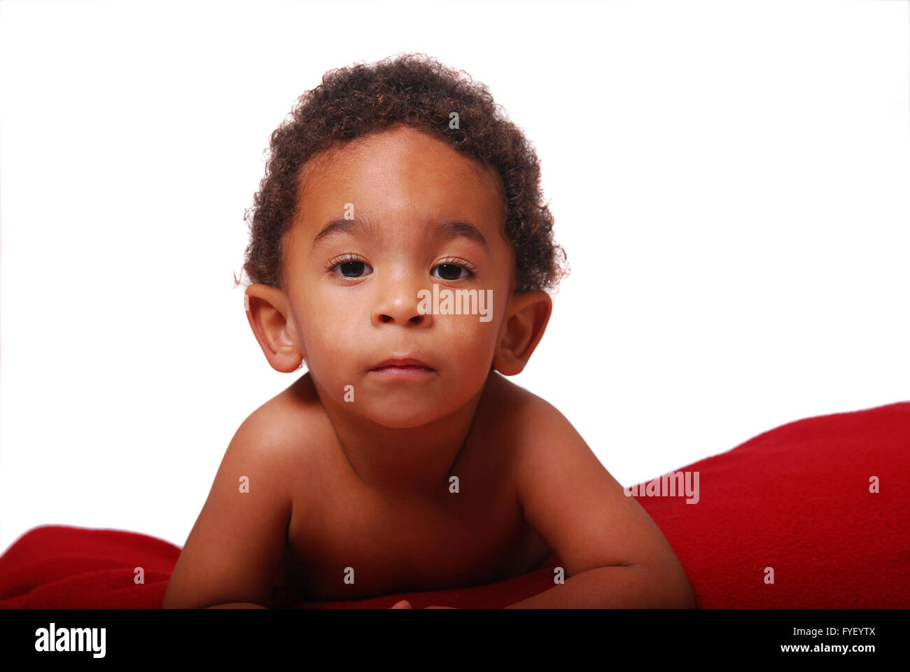 Multi-racial baby wrapped in a blanket Stock Photo - Alamy