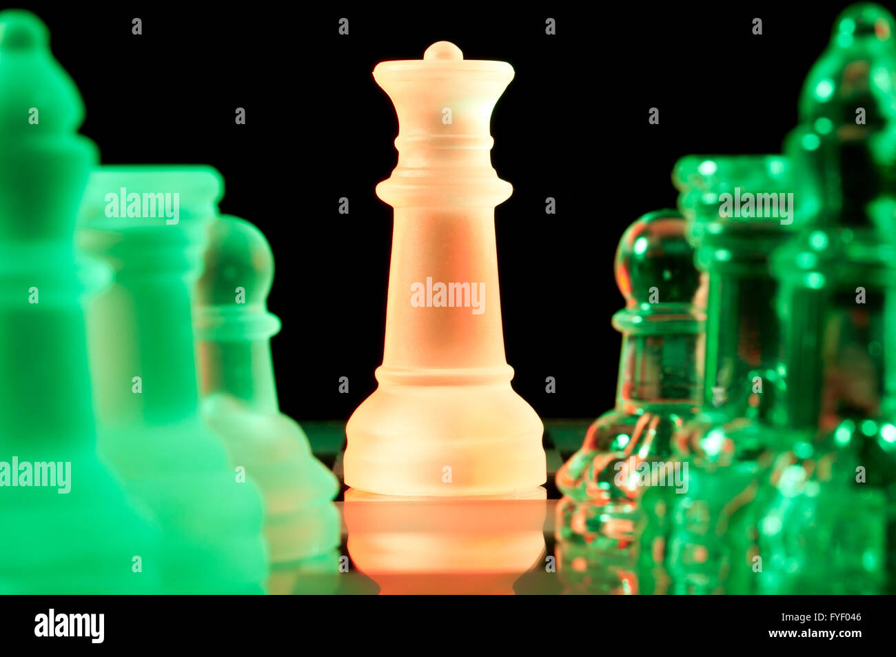 multicolored chess pieces in dark Stock Photo - Alamy
