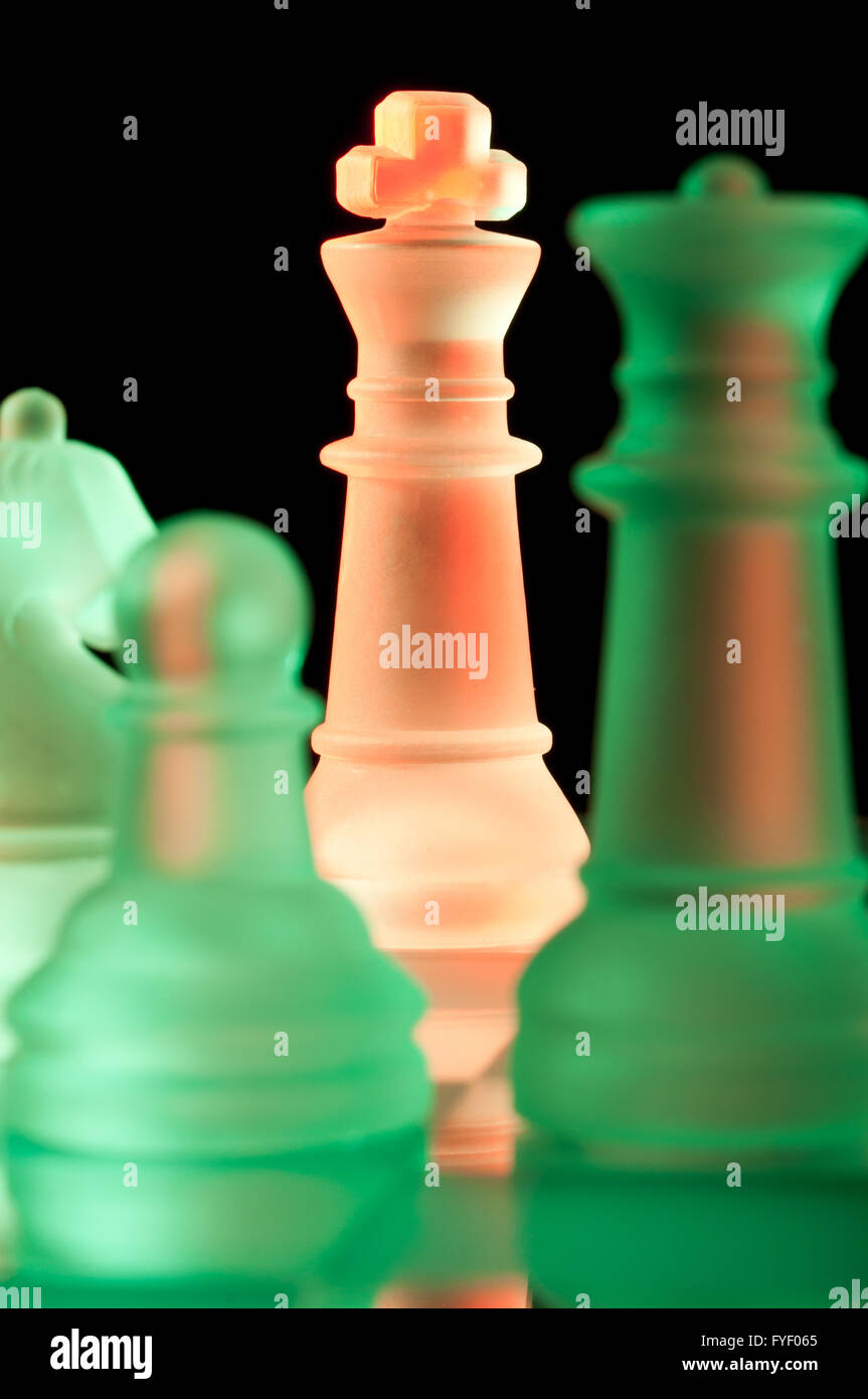 red and green glass chess pieces Stock Photo - Alamy
