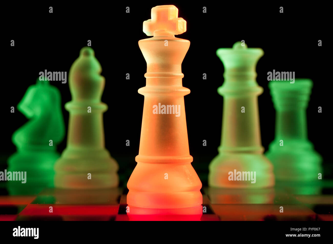 red and green glass chess pieces Stock Photo - Alamy