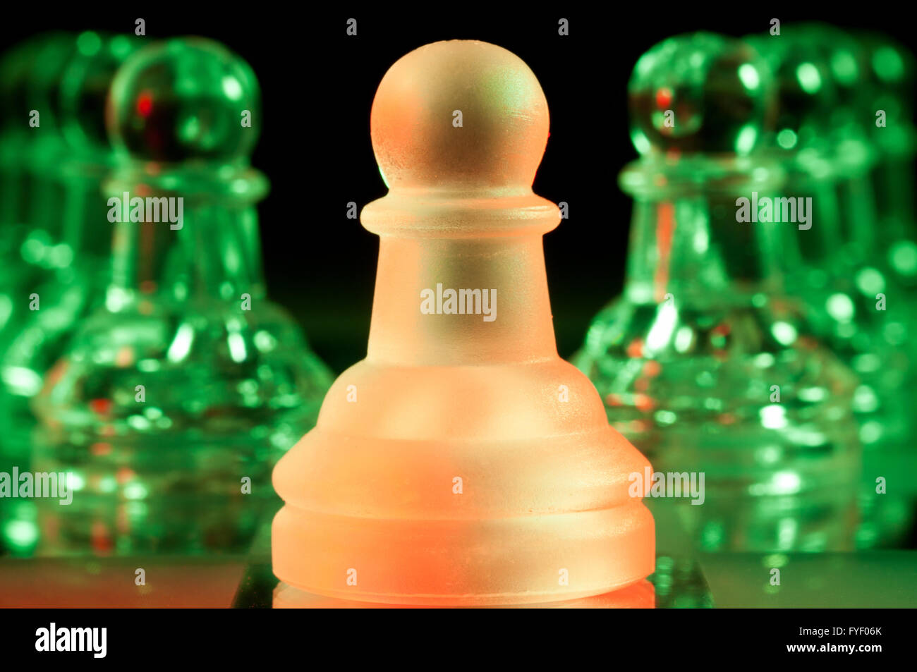 red and green glass chess pieces Stock Photo - Alamy