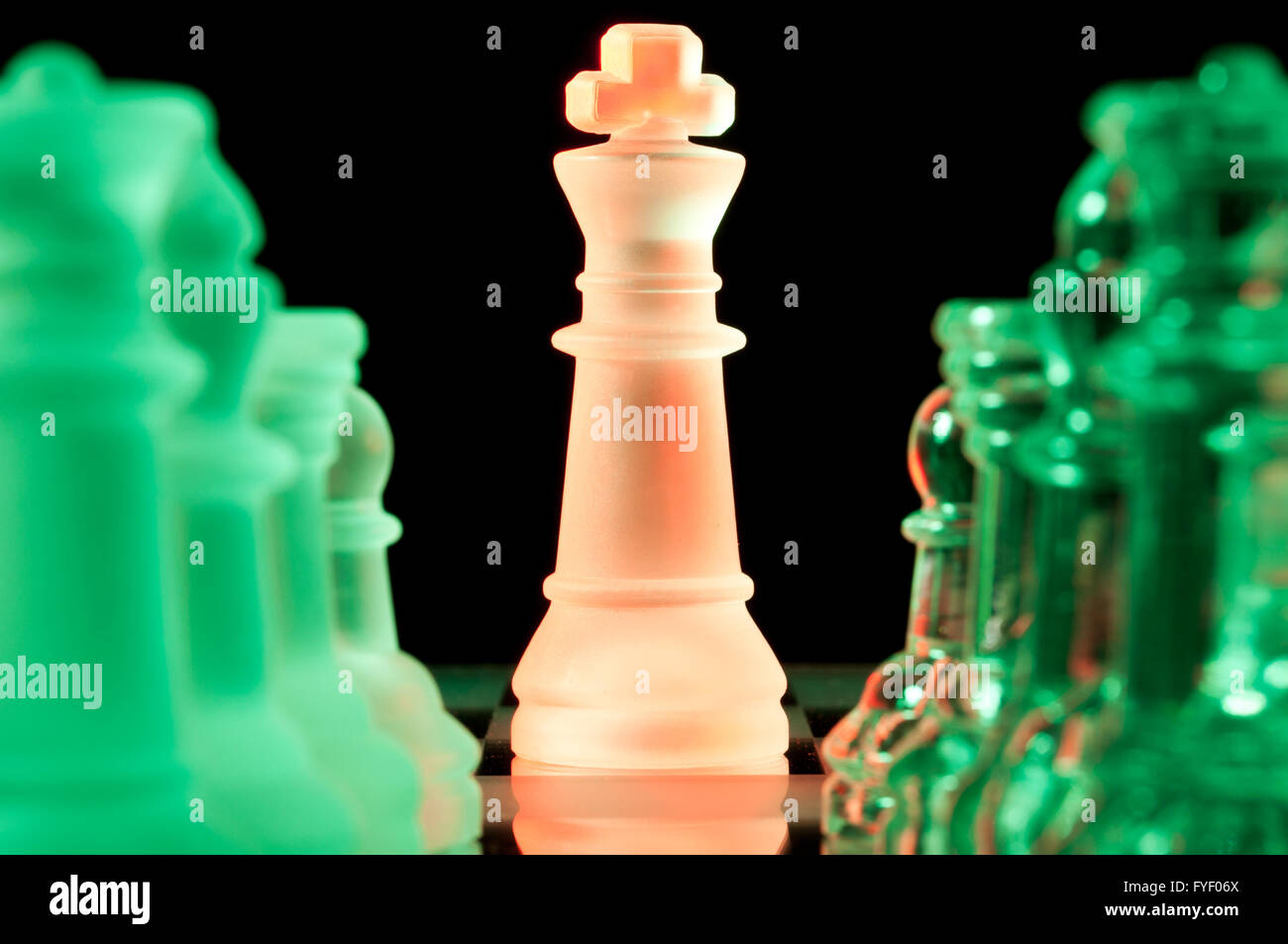 red and green glass chess pieces Stock Photo - Alamy